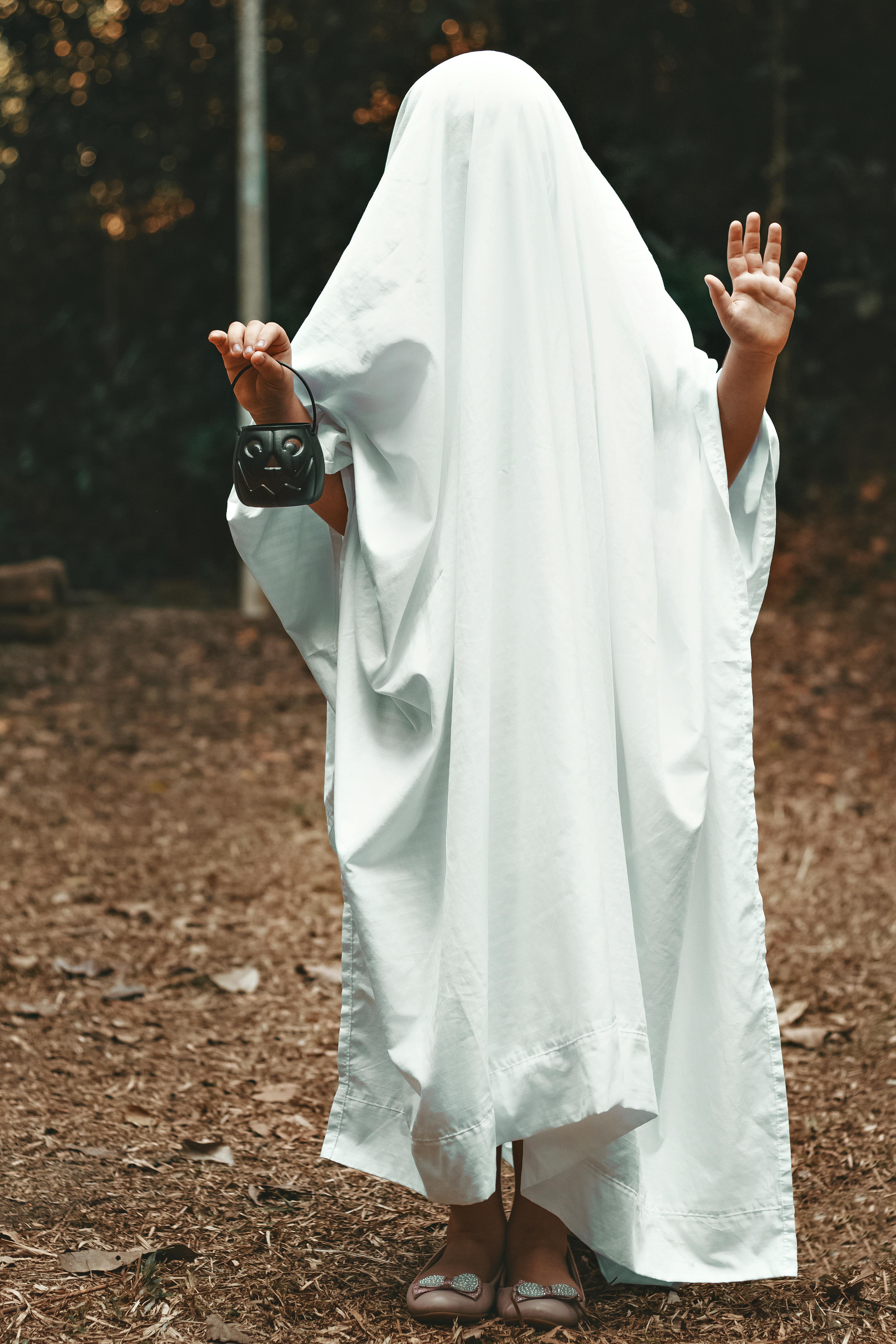 A Person Face Covered with White Cloth · Free Stock Photo