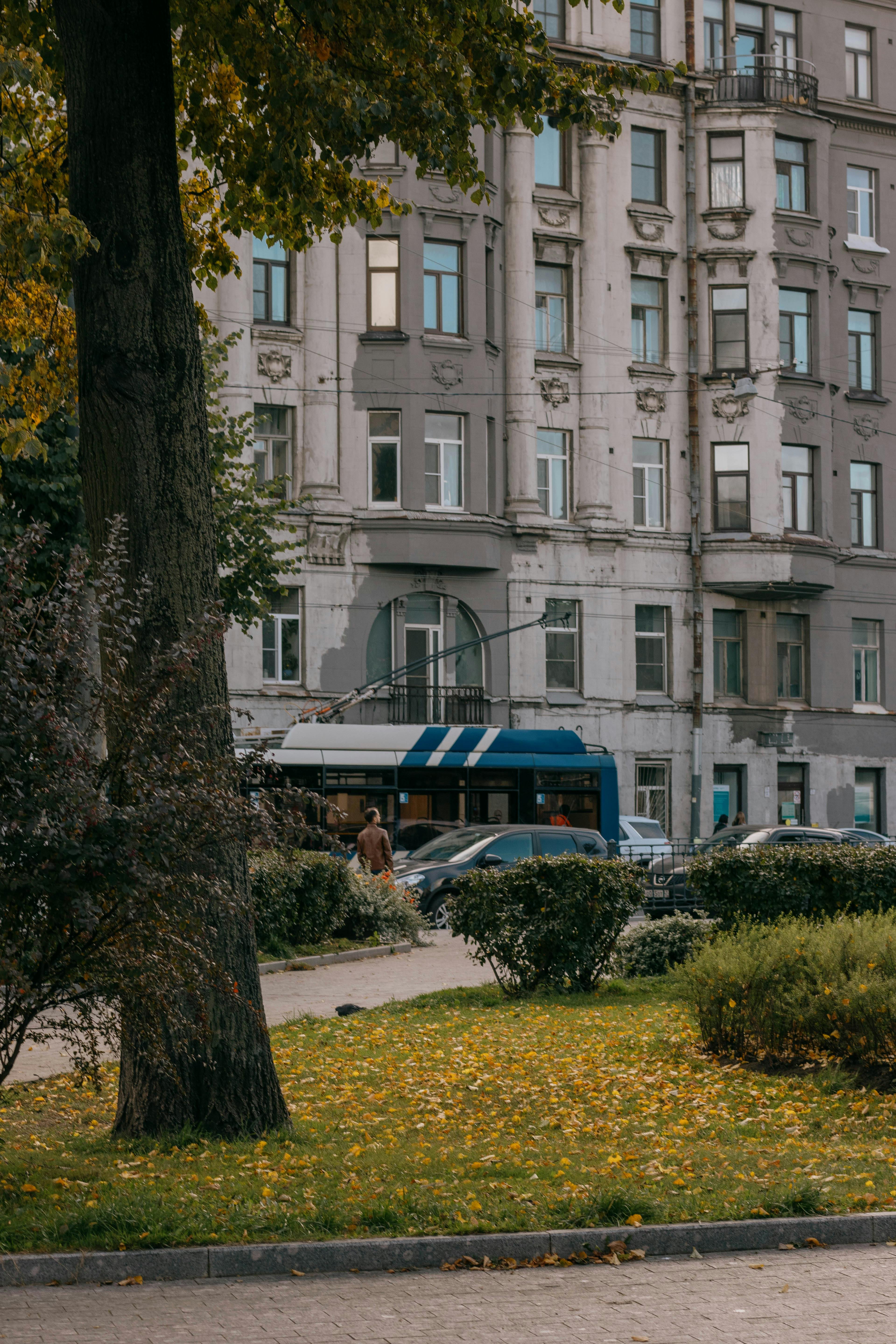 Gray Concrete Building near Green Grass · Free Stock Photo
