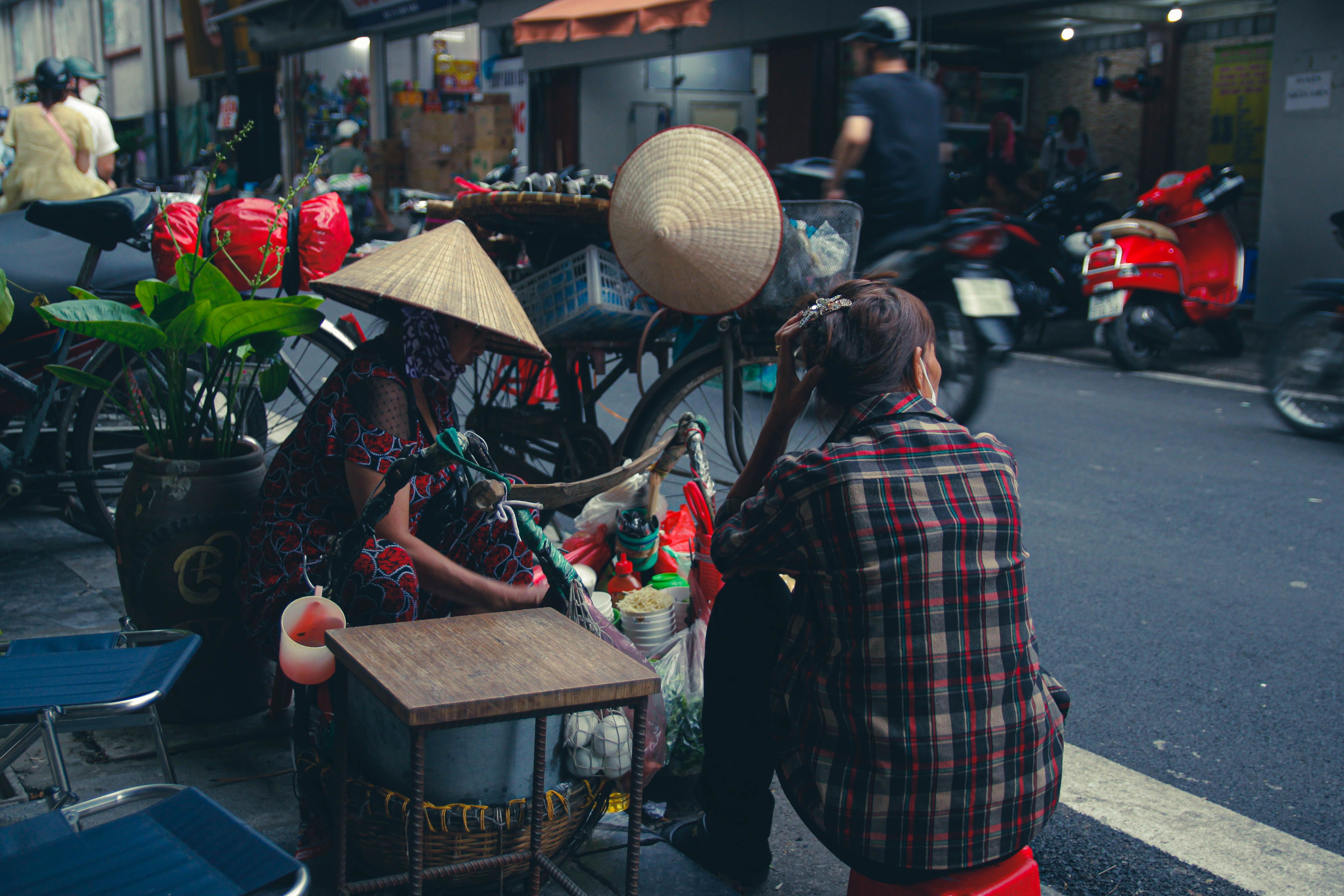 Person Riding Extremely Packed Bike · Free Stock Photo