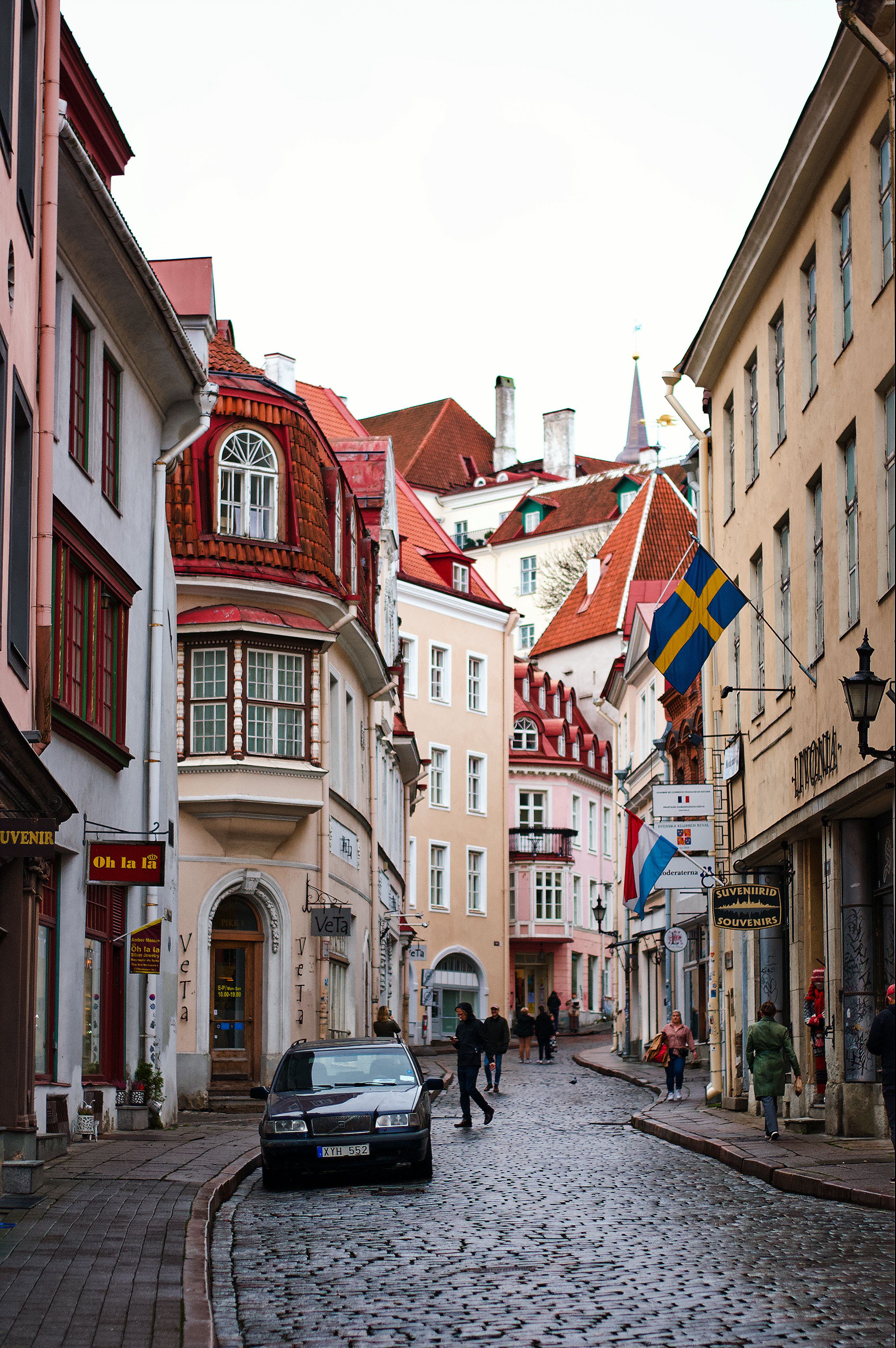 A Photo of Cobblestone Street Between Buildings · Free Stock Photo