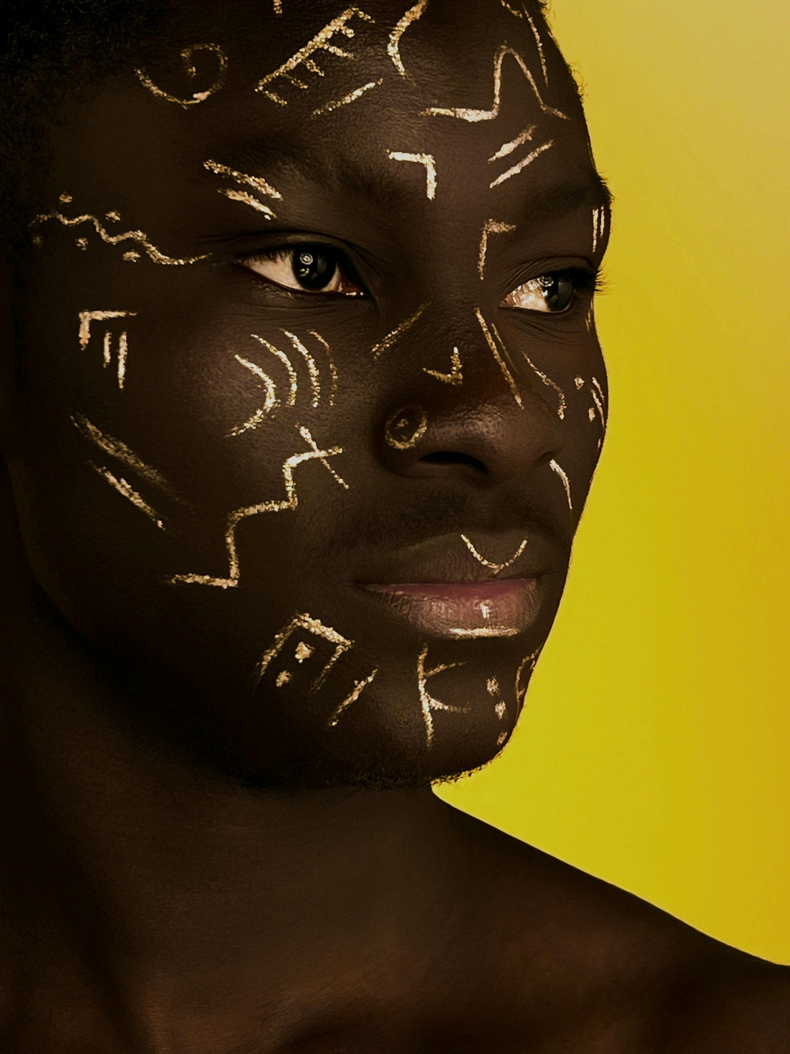 Portrait of a Man with Face Paint · Free Stock Photo