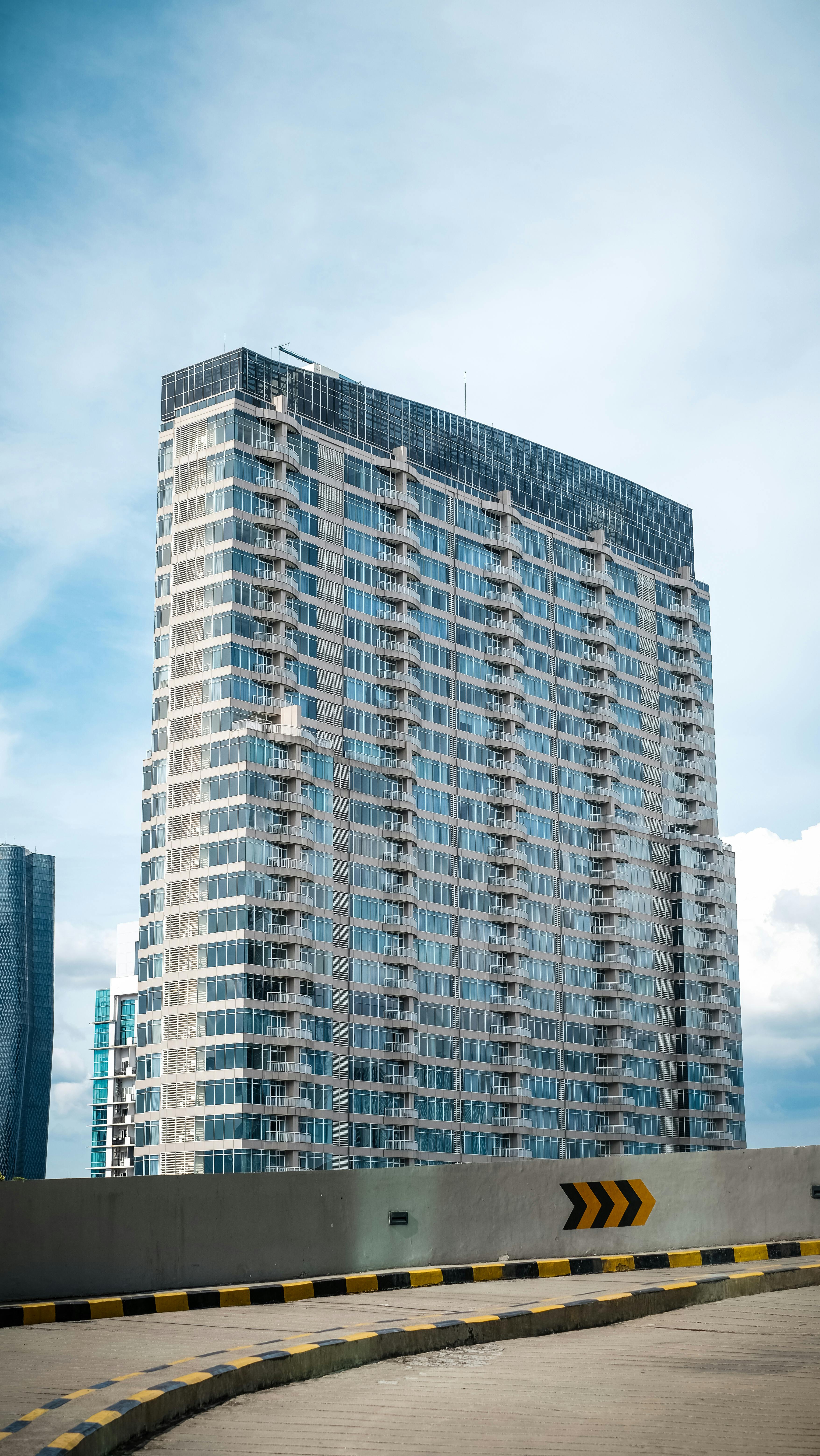 Exterior Design of a Tall Building · Free Stock Photo