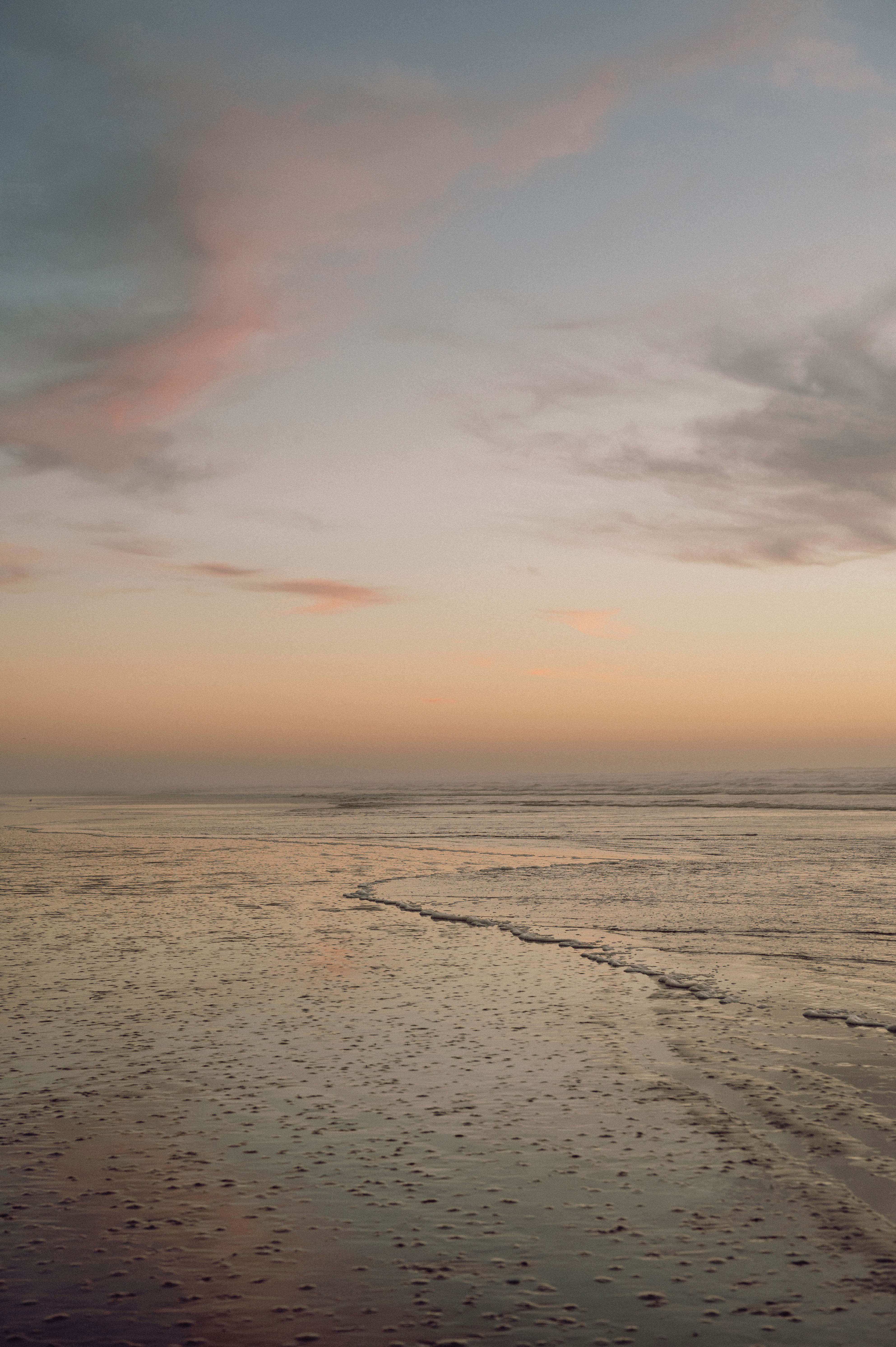 Waves Kissing the Shoreline During Sunset · Free Stock Photo