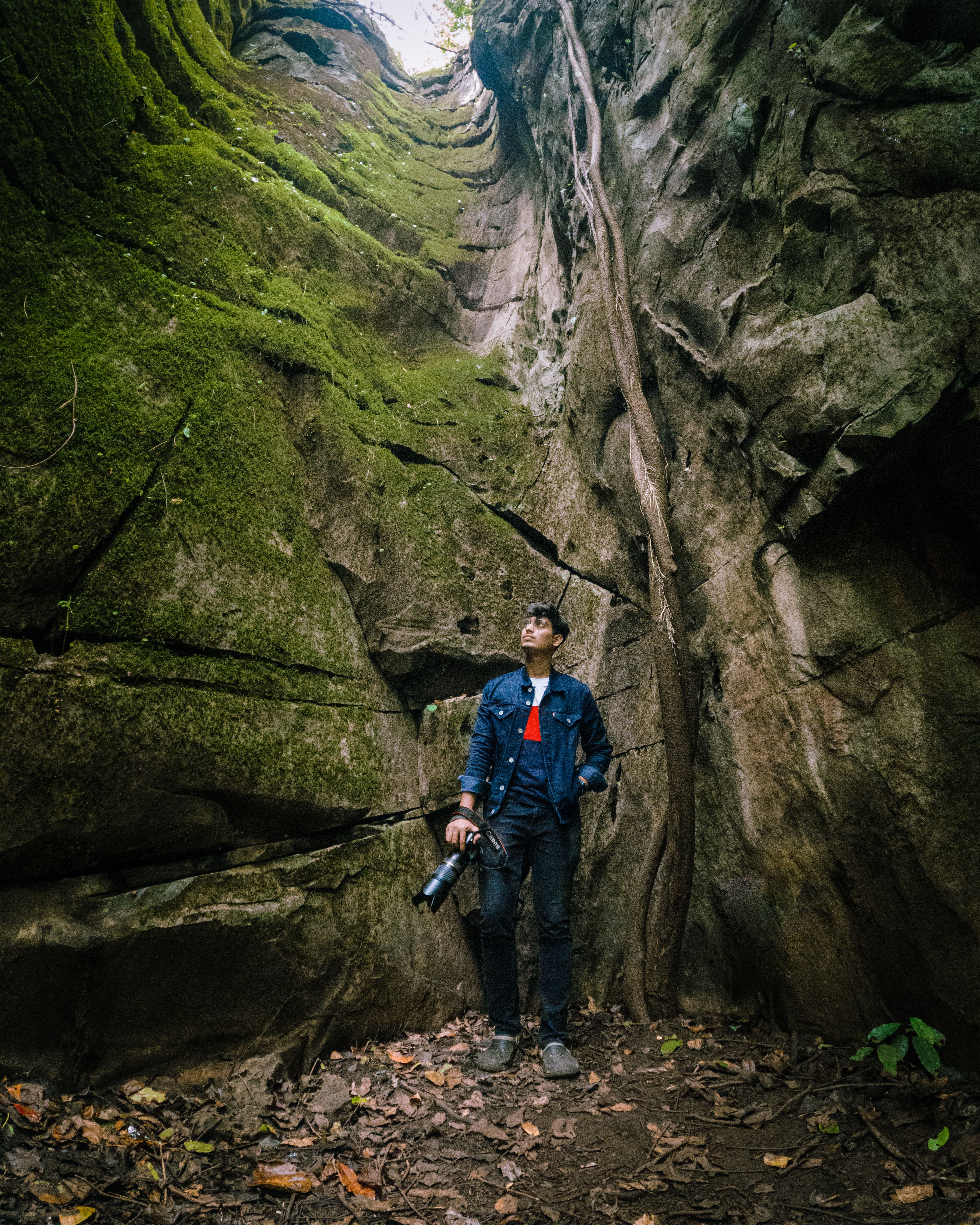Photographer against Rock Formation · Free Stock Photo
