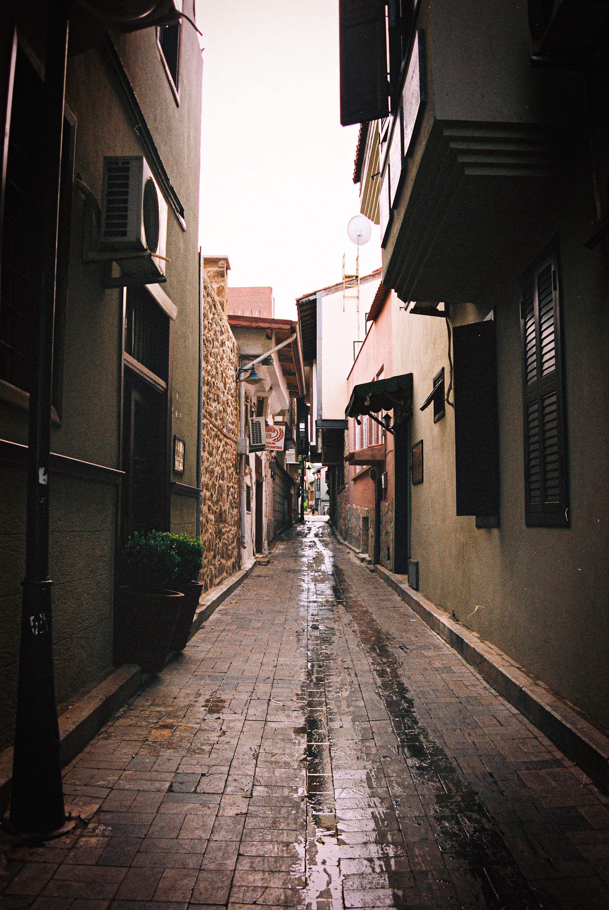 Narrow Street in Between Buildings · Free Stock Photo