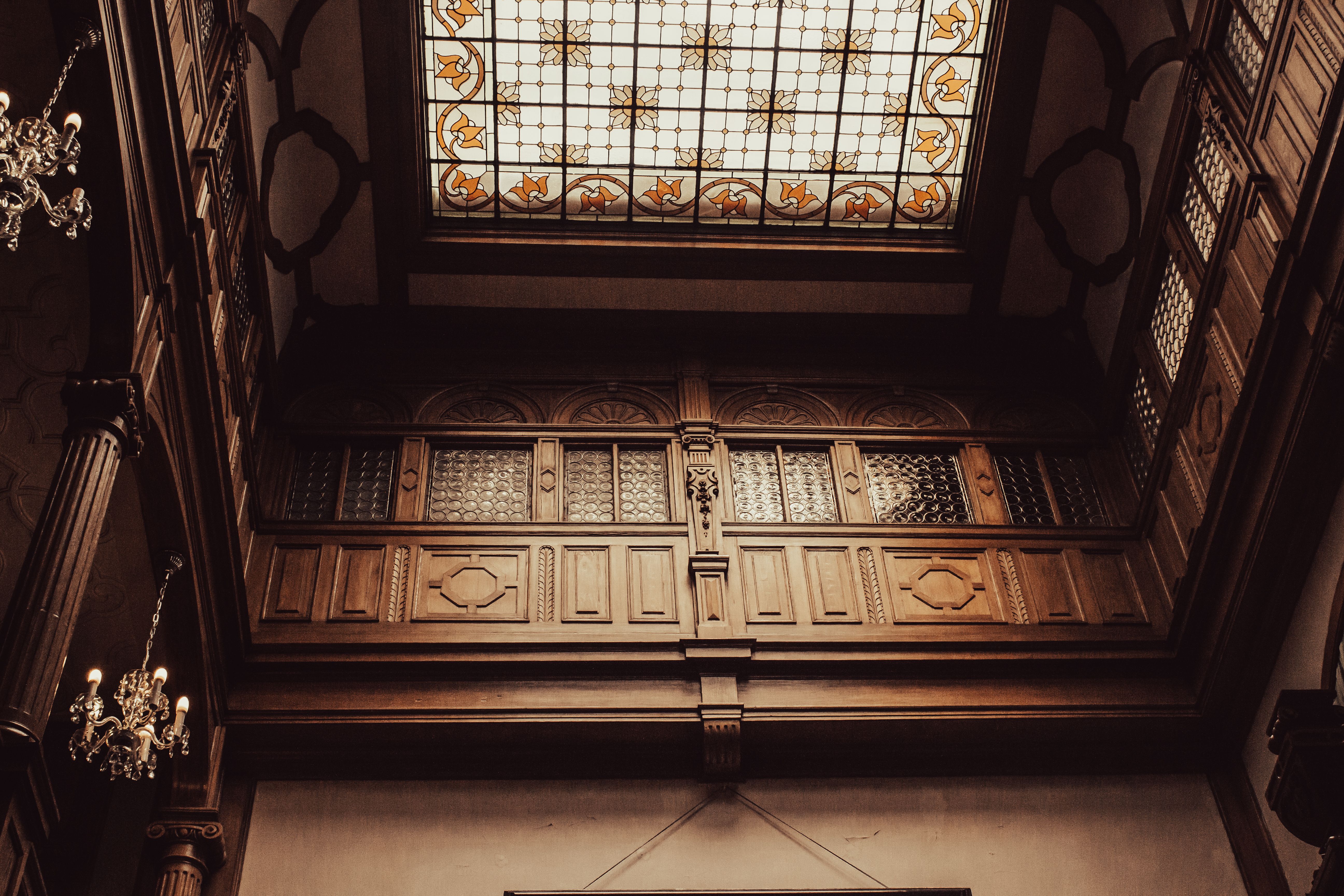 Low Angle Shot of a Building Interior with Wooden Walls · Free Stock Photo