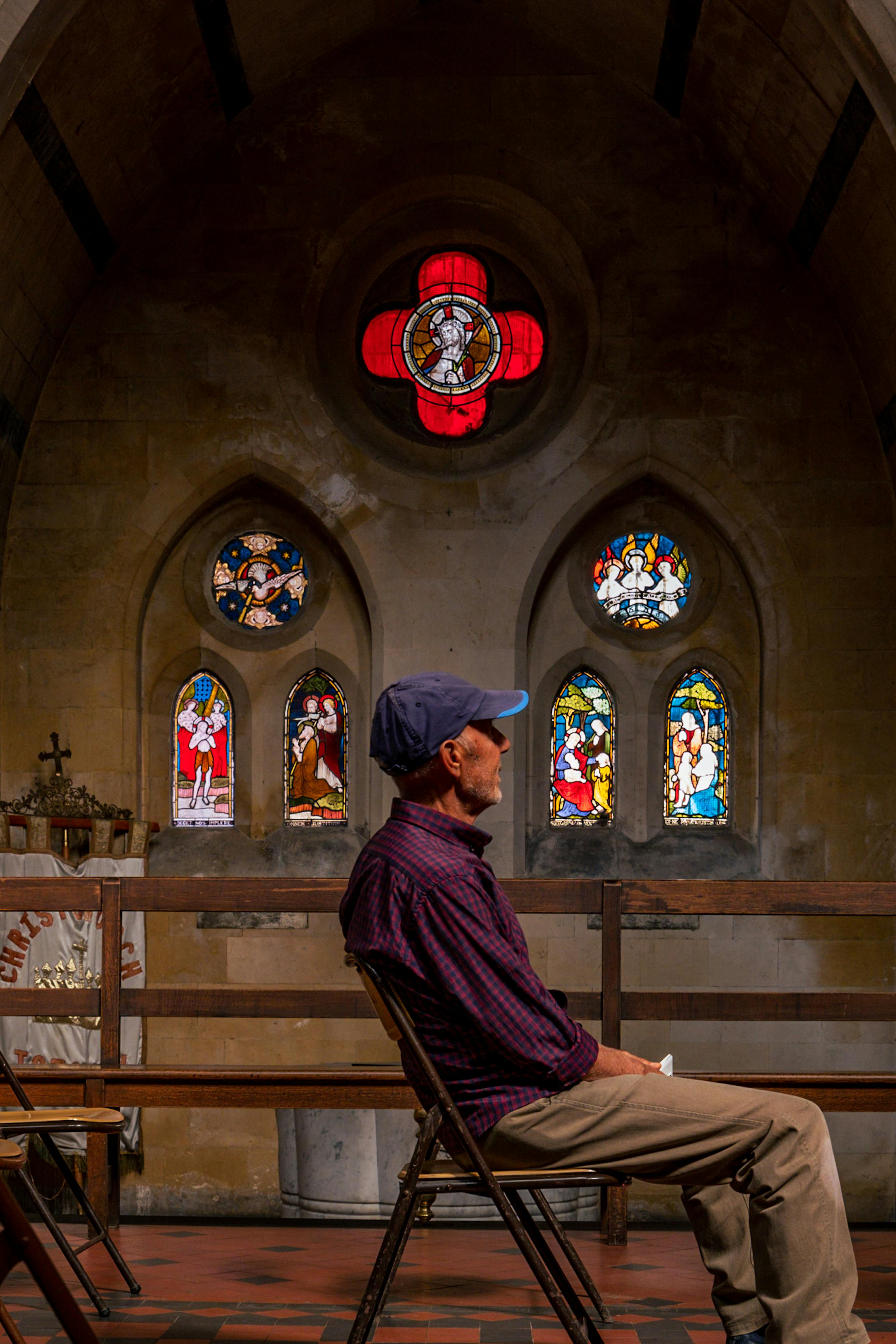 An Elderly Man Praying inside the Church · Free Stock Photo