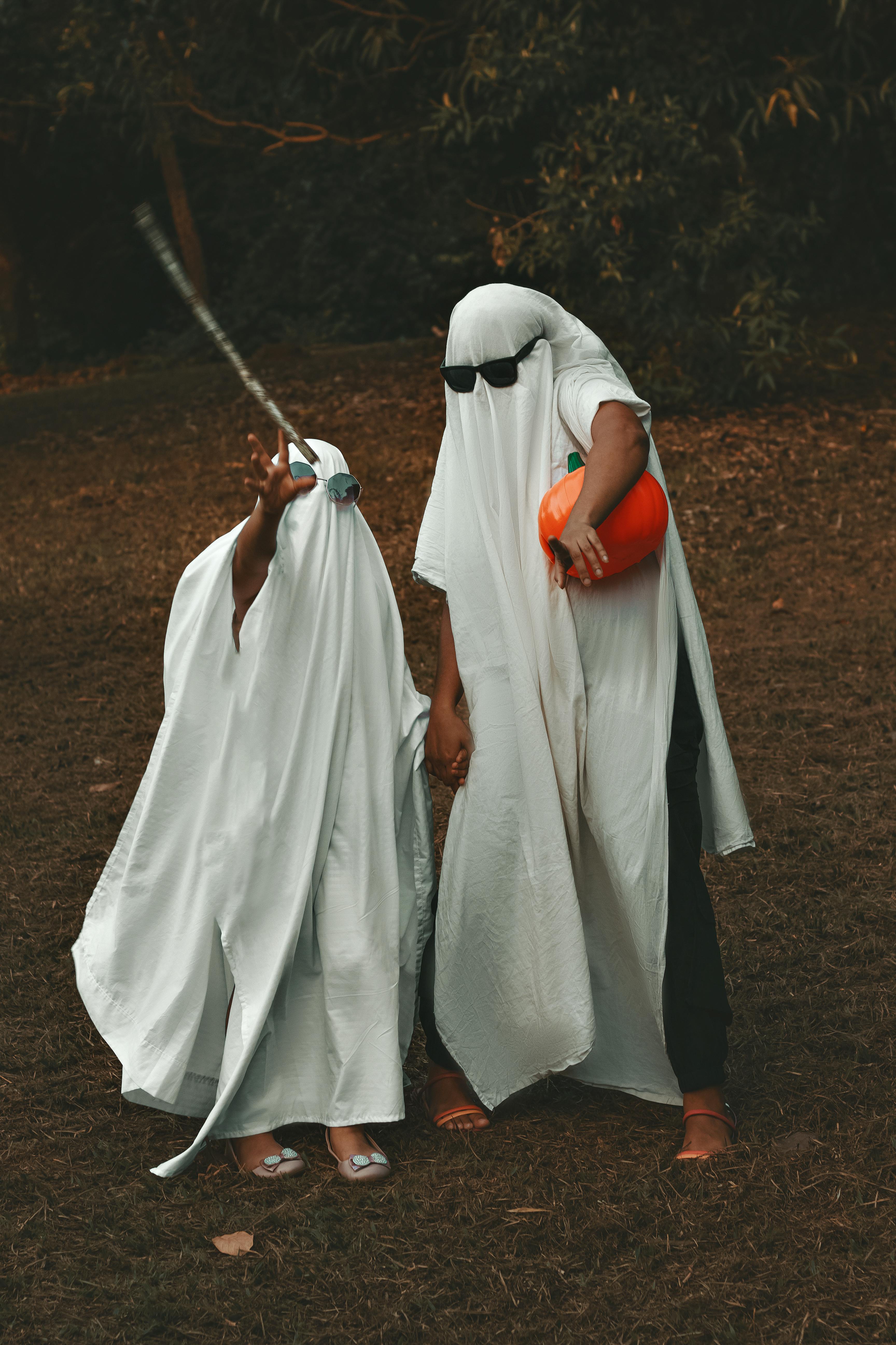 Person Wearing a Carved Pumpkin on Head · Free Stock Photo