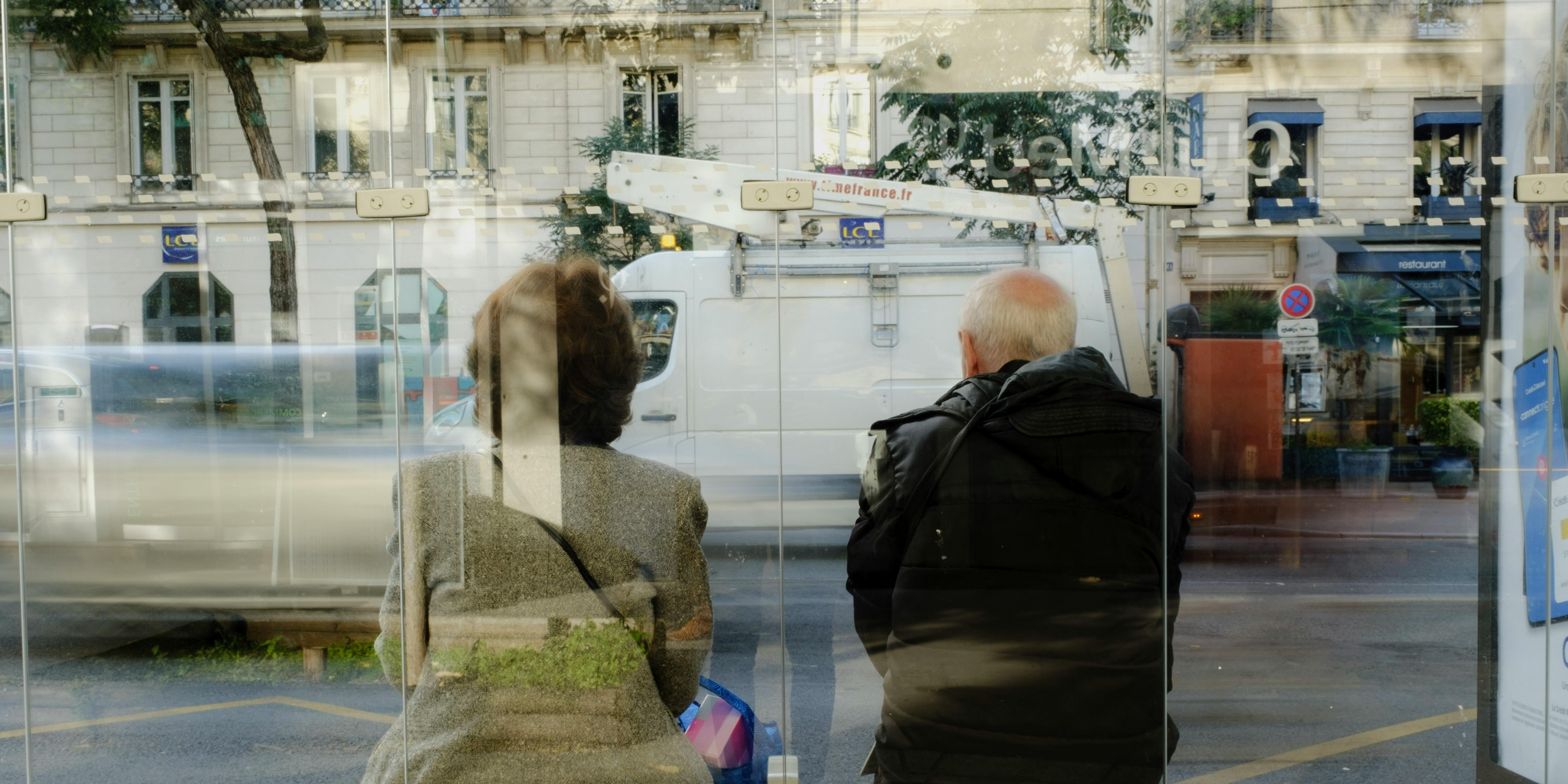 Man at Bus Stop · Free Stock Photo
