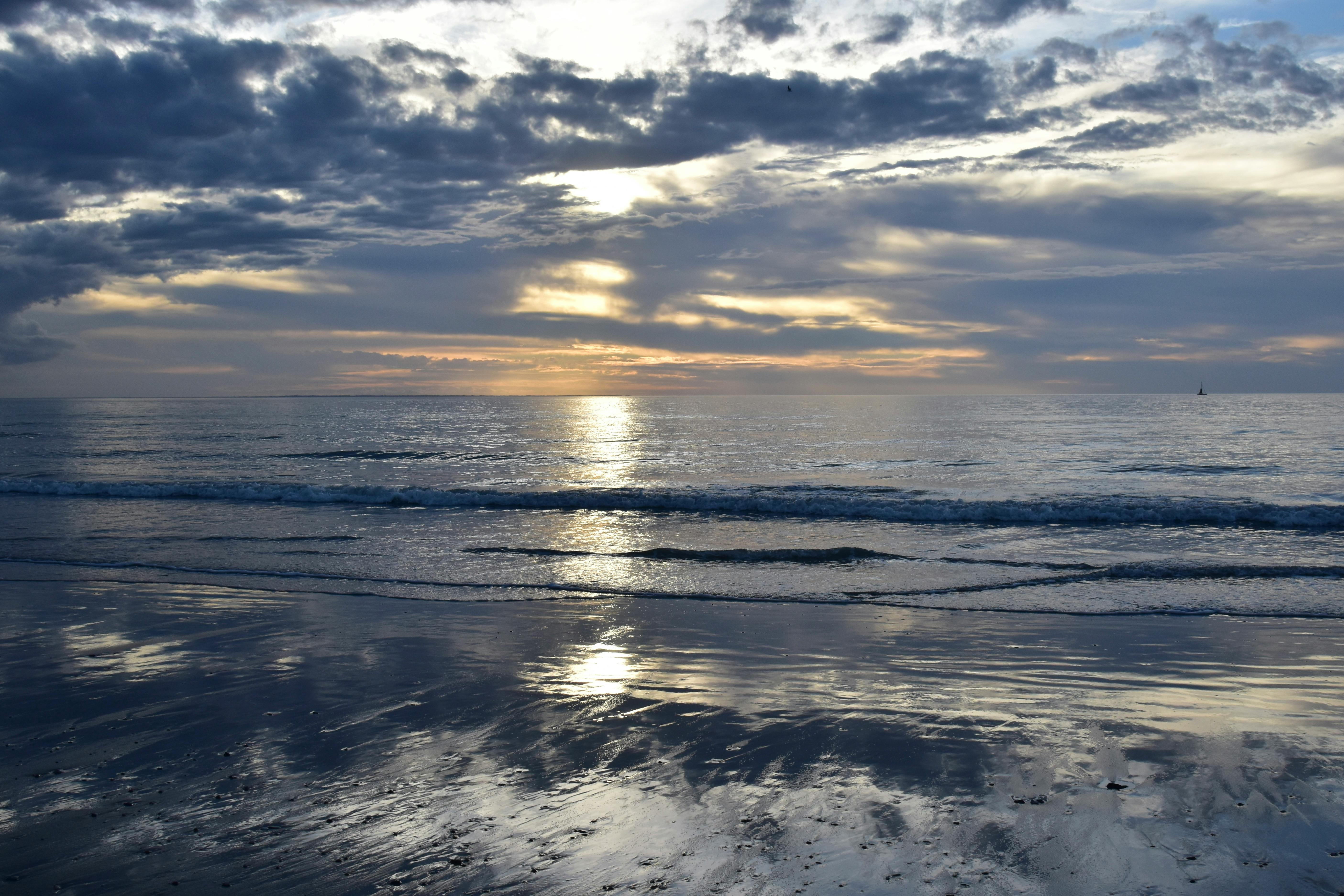 Early Morning Sea Waves Kissing the Beach shore · Free Stock Photo