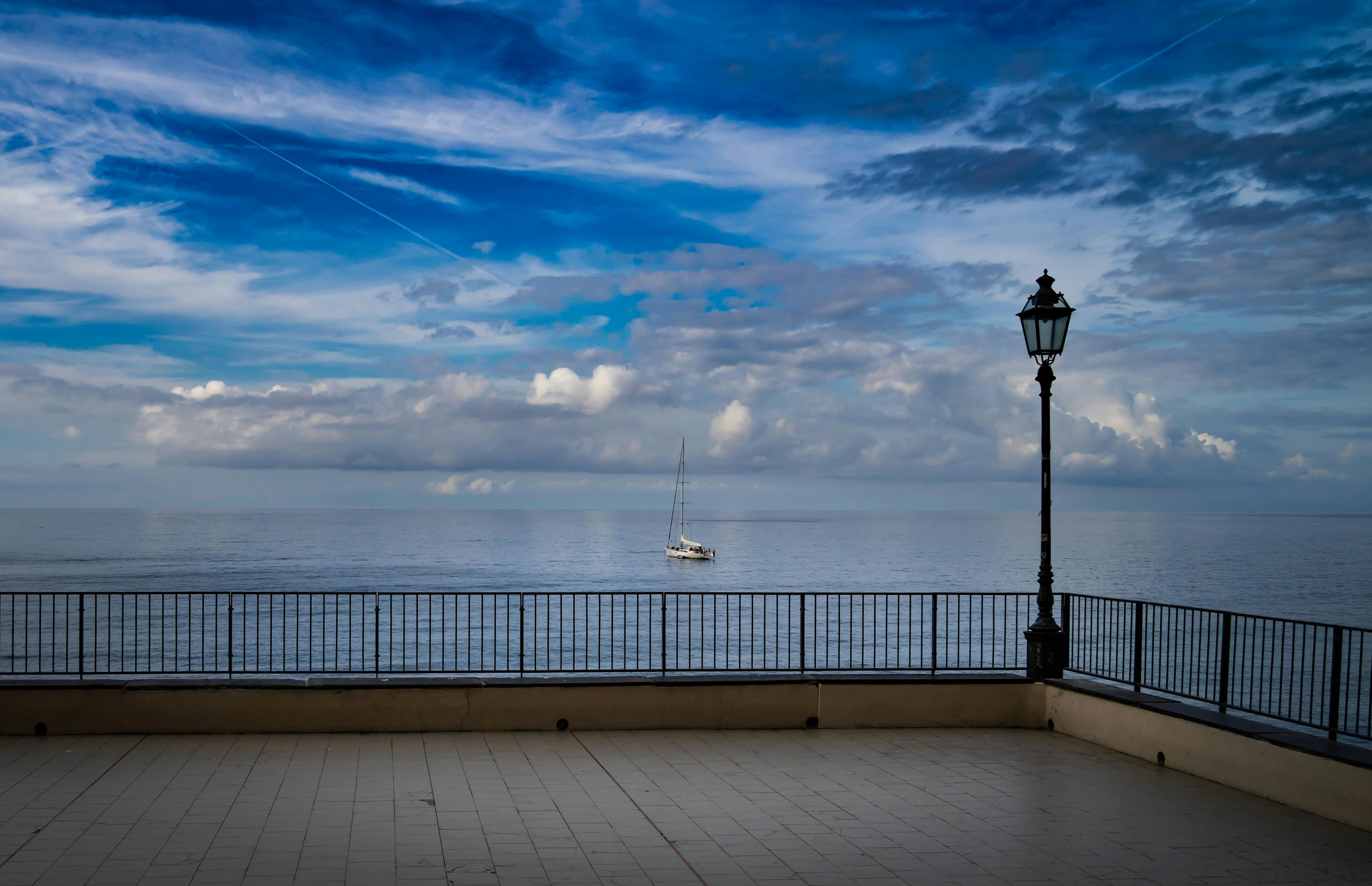 Lamp on a Harbor by the Sea · Free Stock Photo