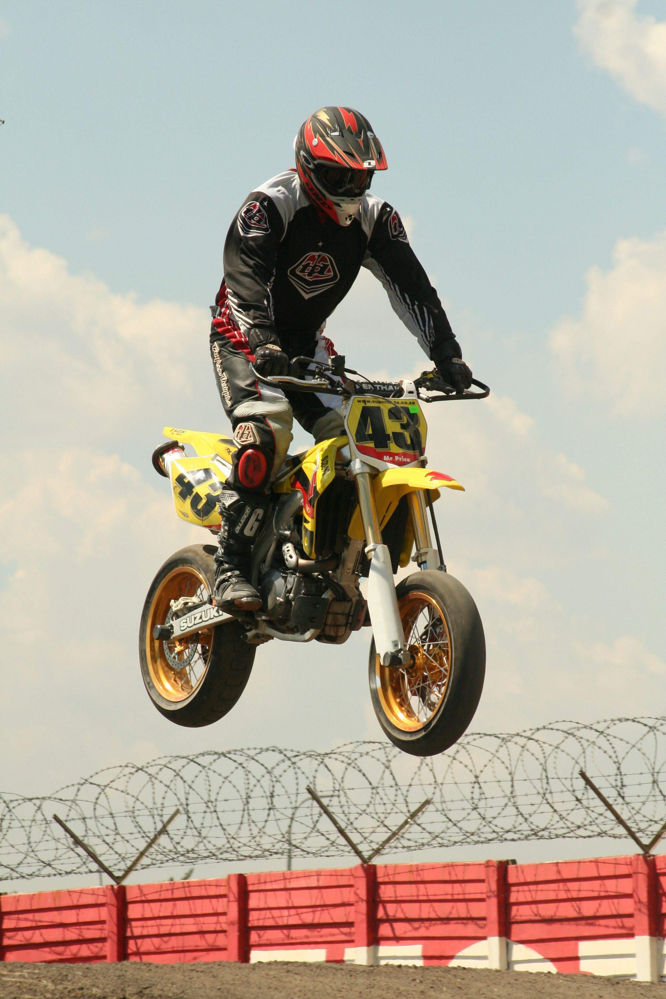 Man Doing Midair Stunts on a Motorcycle · Free Stock Photo
