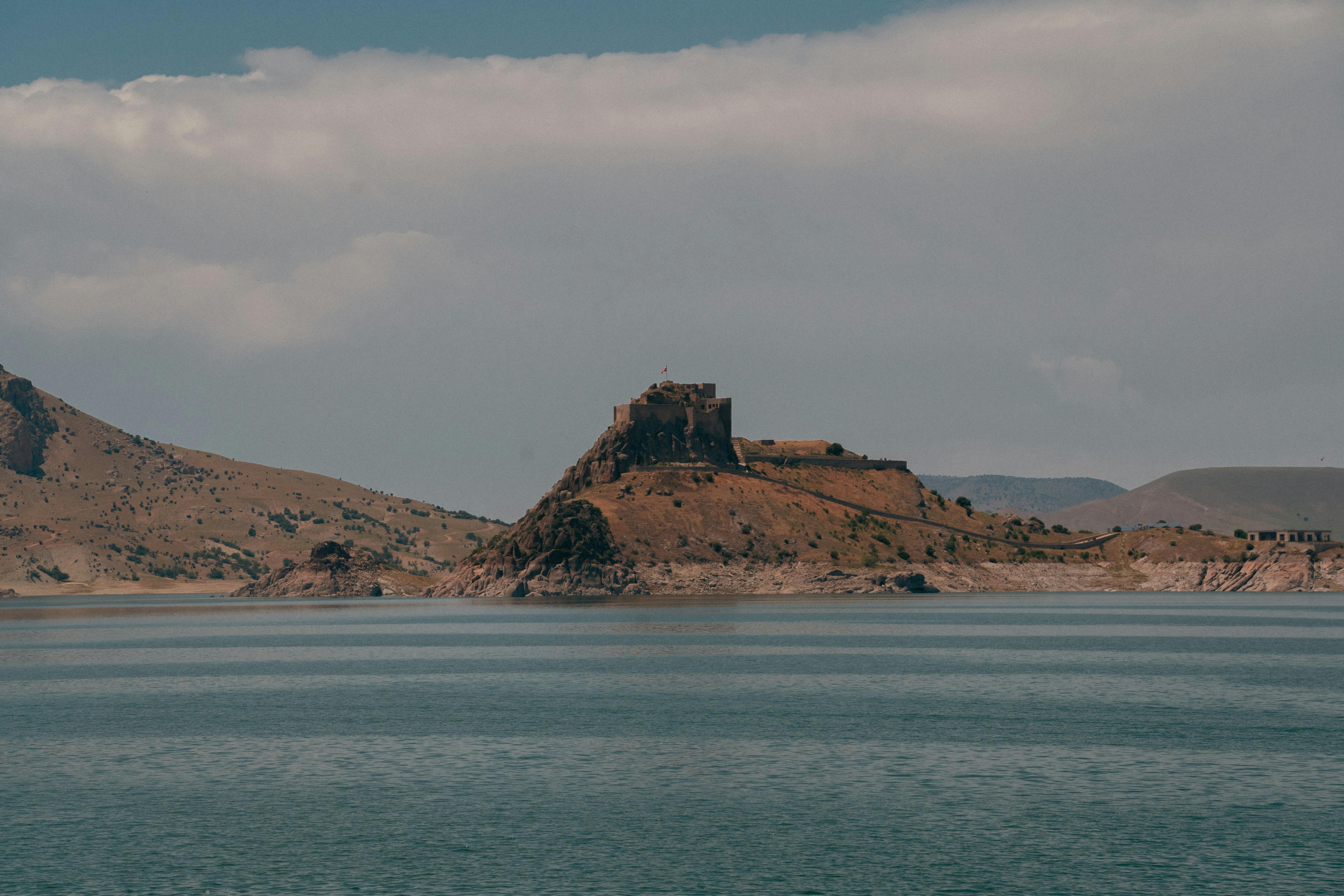 Pertek Castle on the Seashore in Turkey · Free Stock Photo