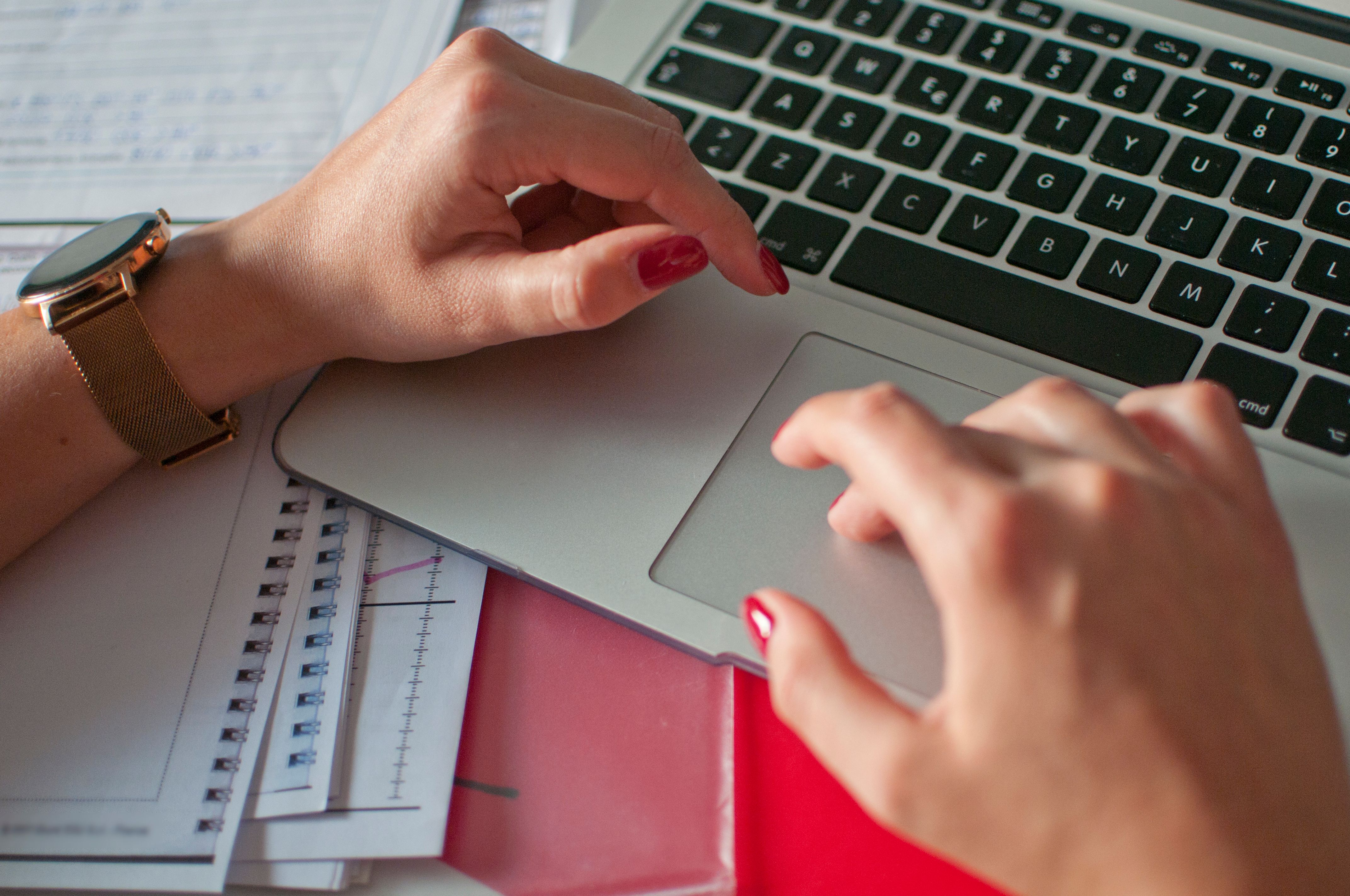 Person Browsing on a Laptop · Free Stock Photo
