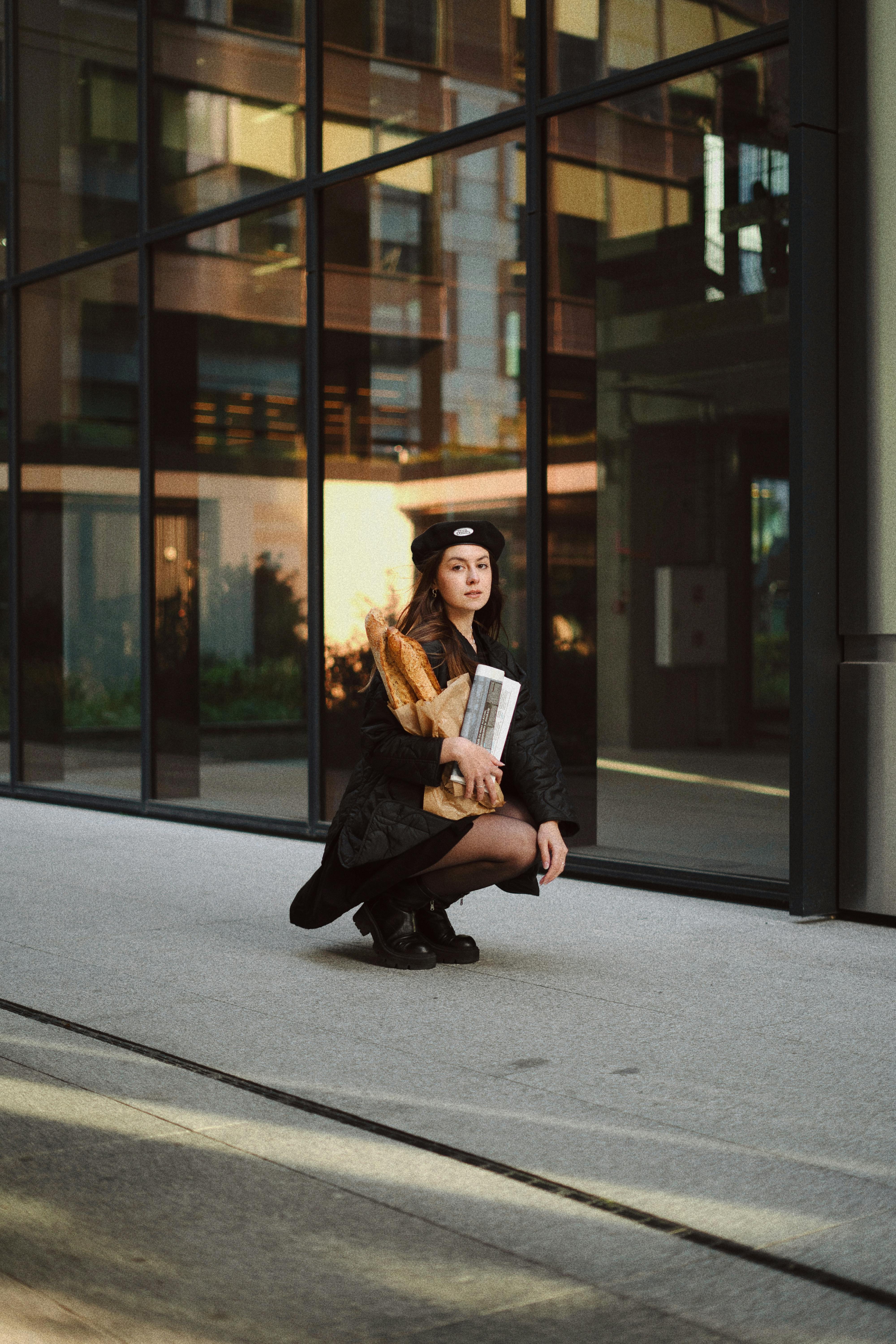 Woman Walking Beside a Building · Free Stock Photo