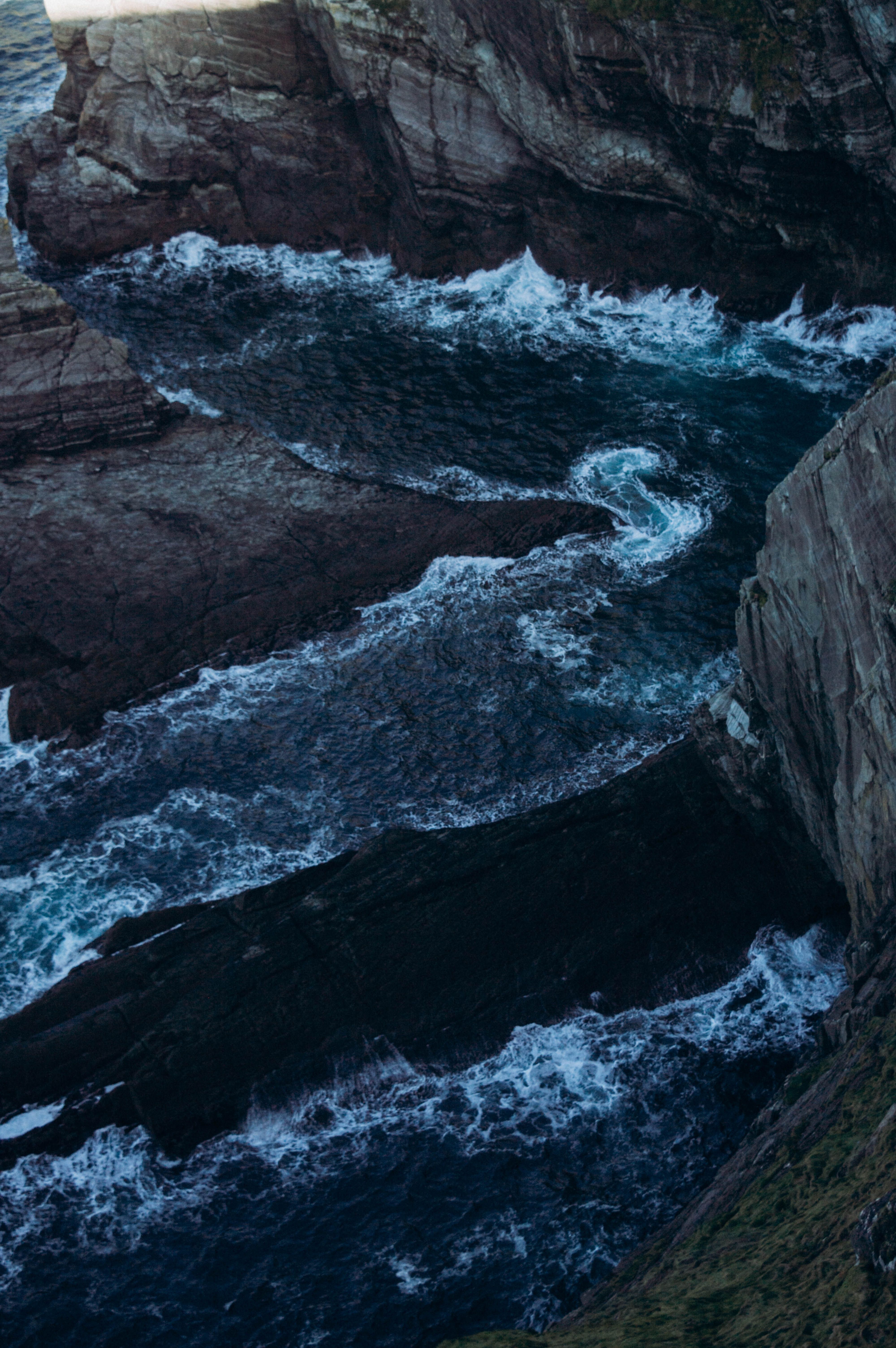 Sea Crashing by High Rise Cliff · Free Stock Photo