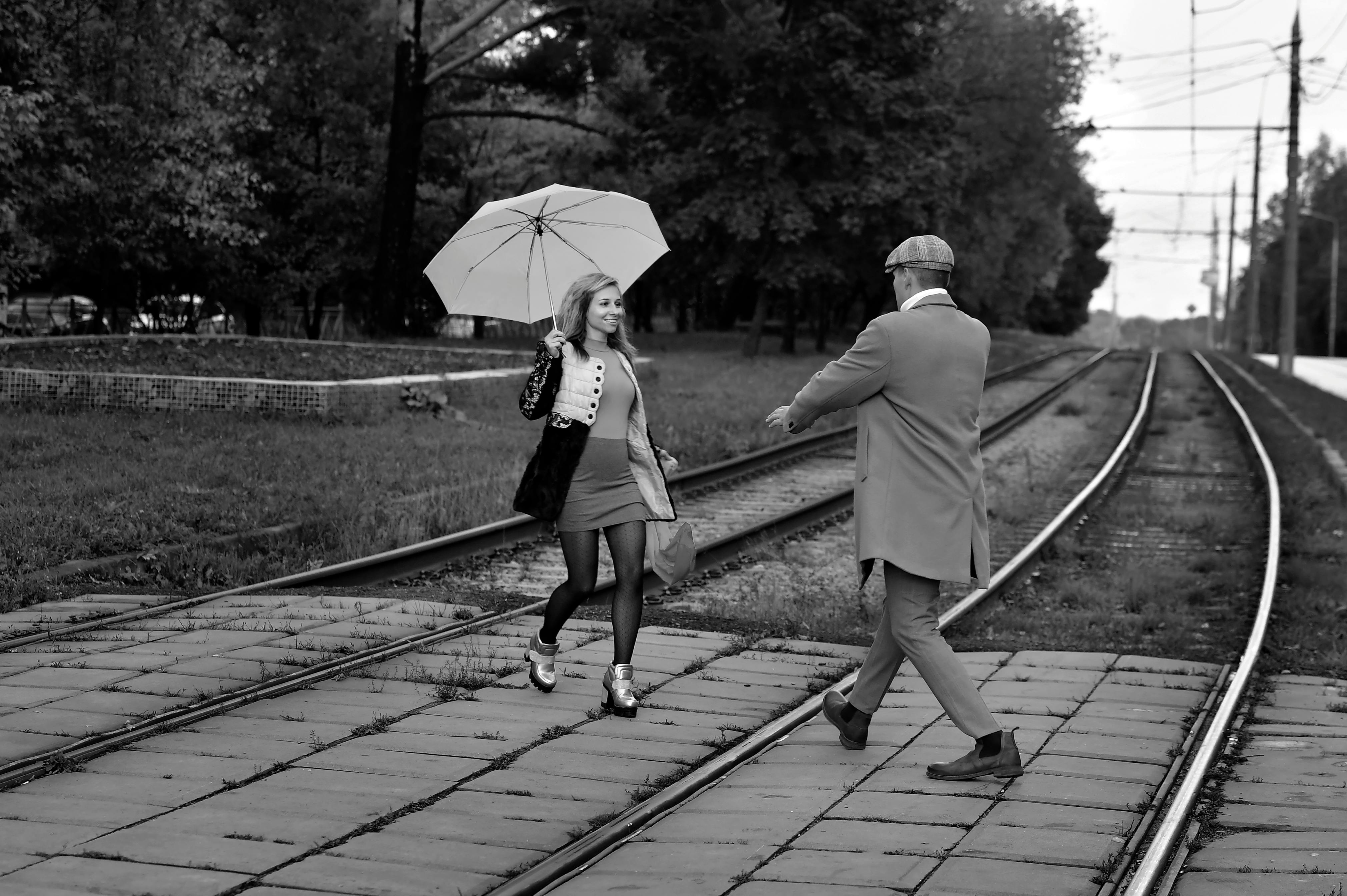 Grayscale Photo of Couple Looking at Each Other · Free Stock Photo