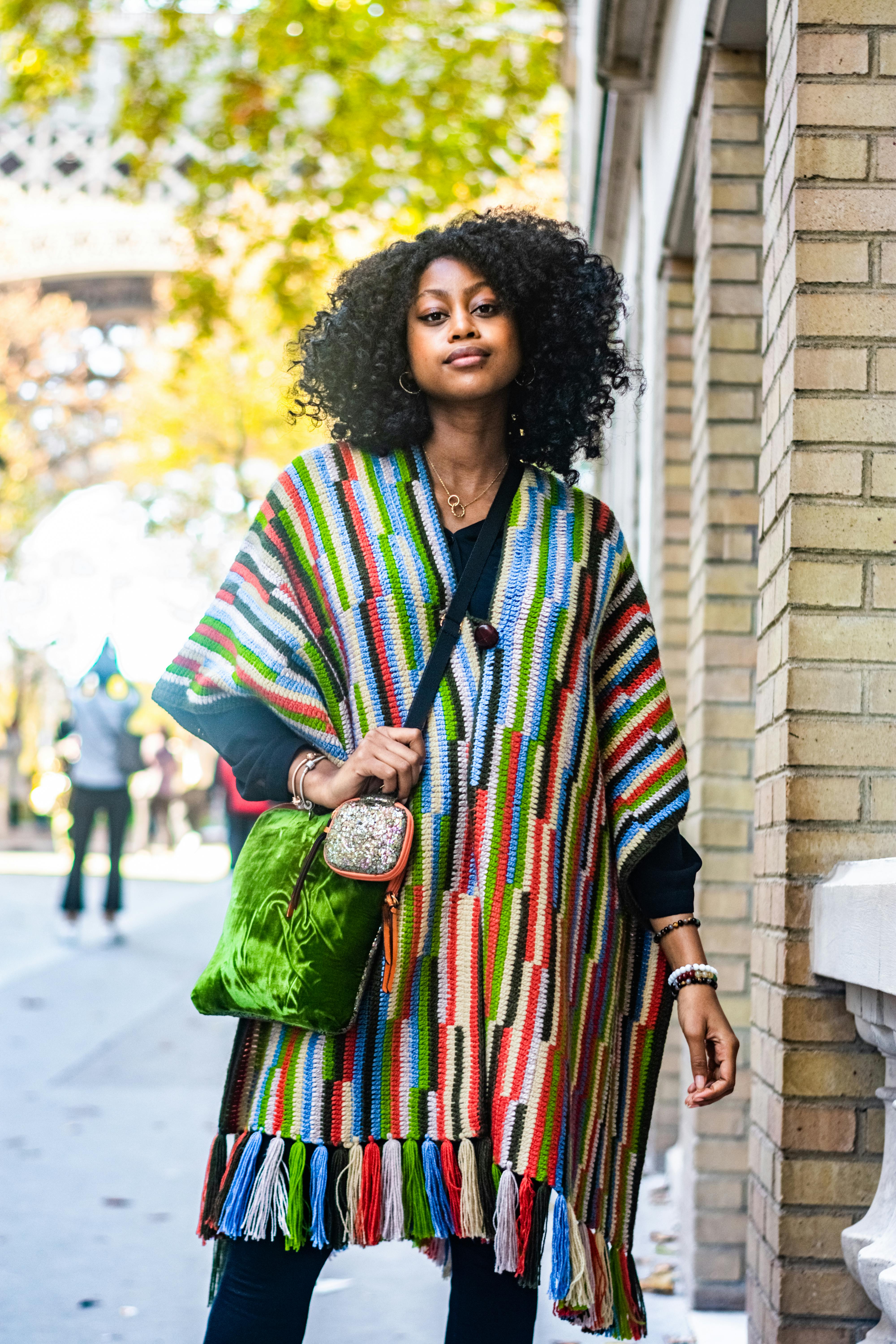 Woman Wearing a Colorful Poncho · Free Stock Photo