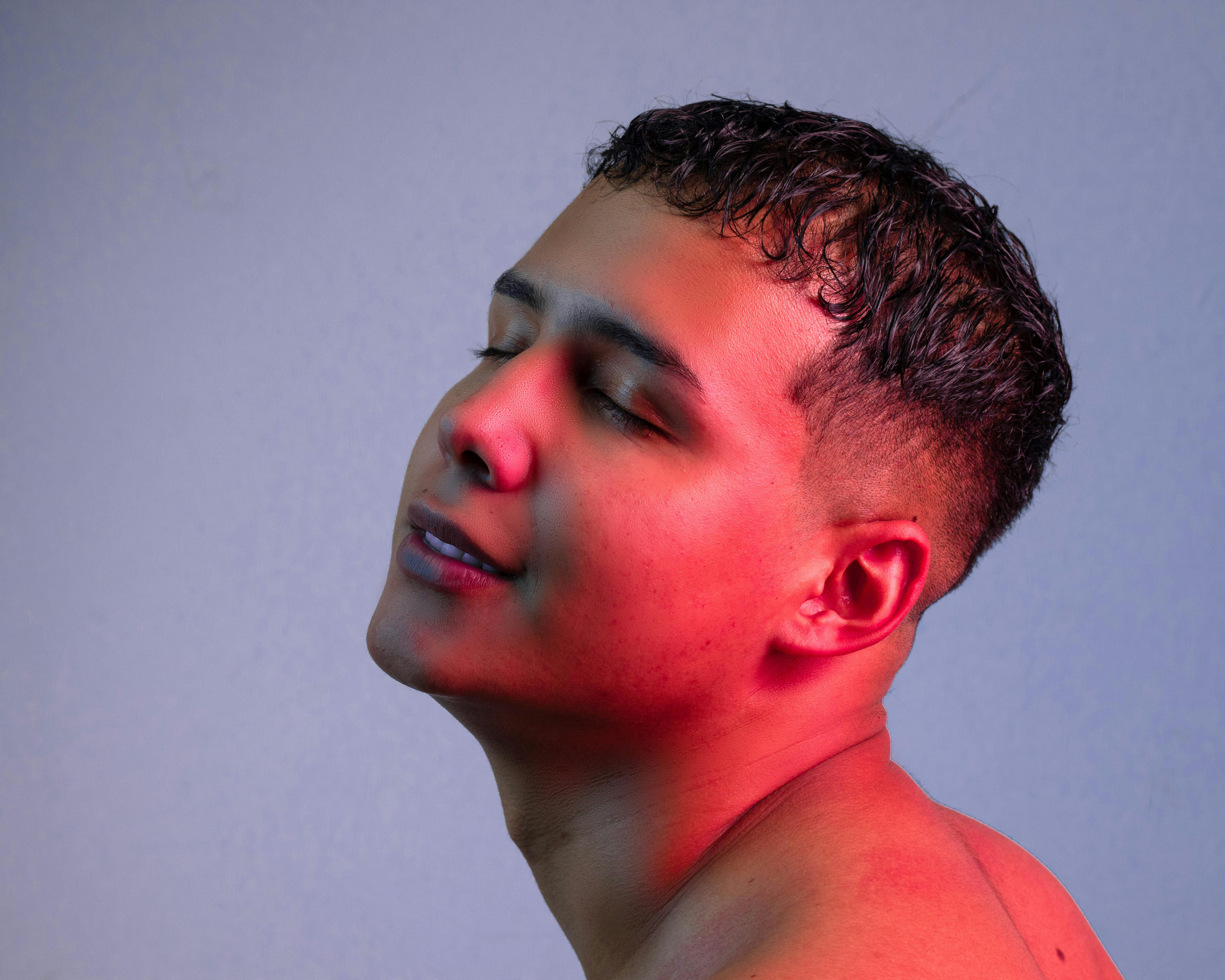 Portrait of a Man with His Eyes Closed · Free Stock Photo