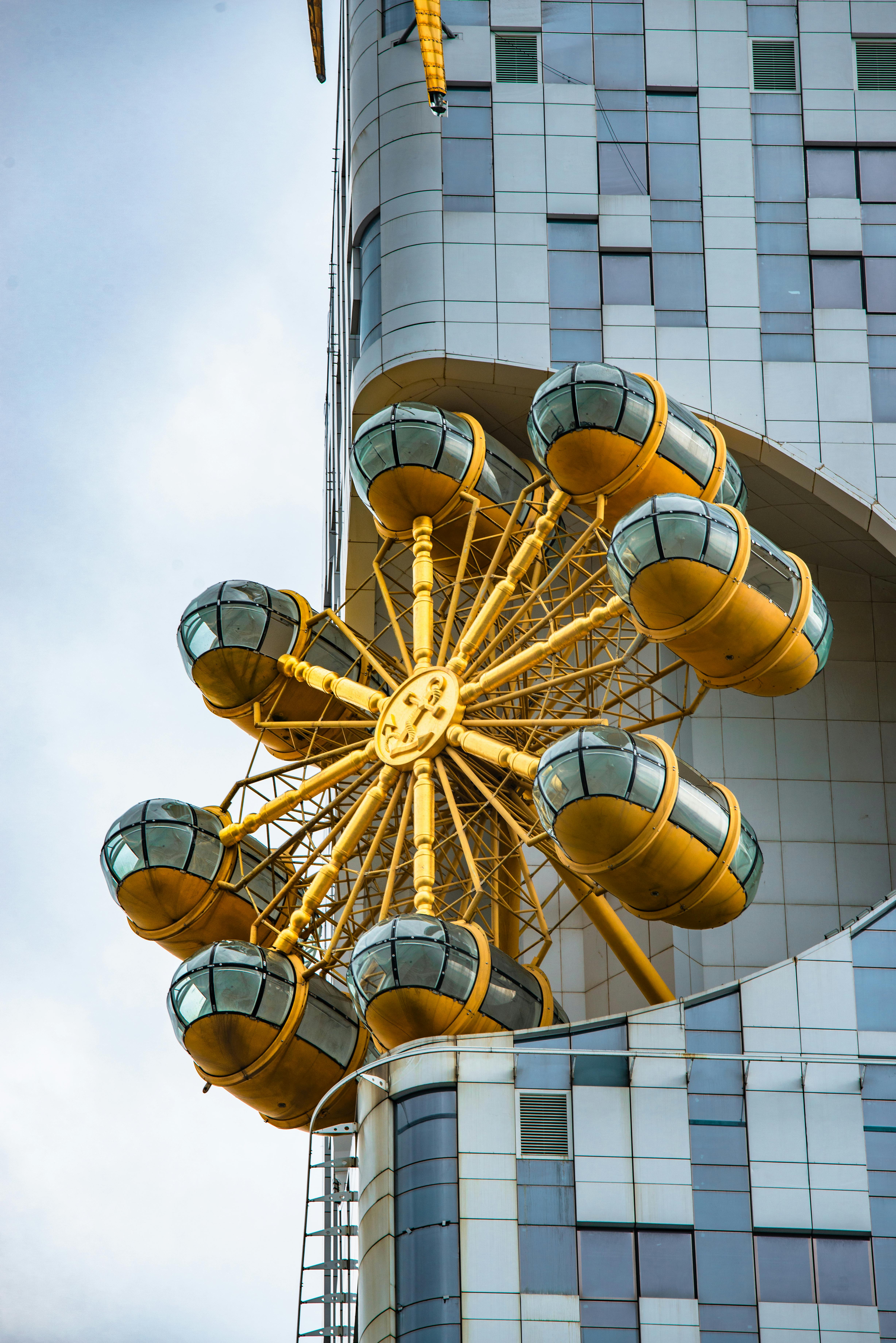 Ferris Wheel on a Building · Free Stock Photo