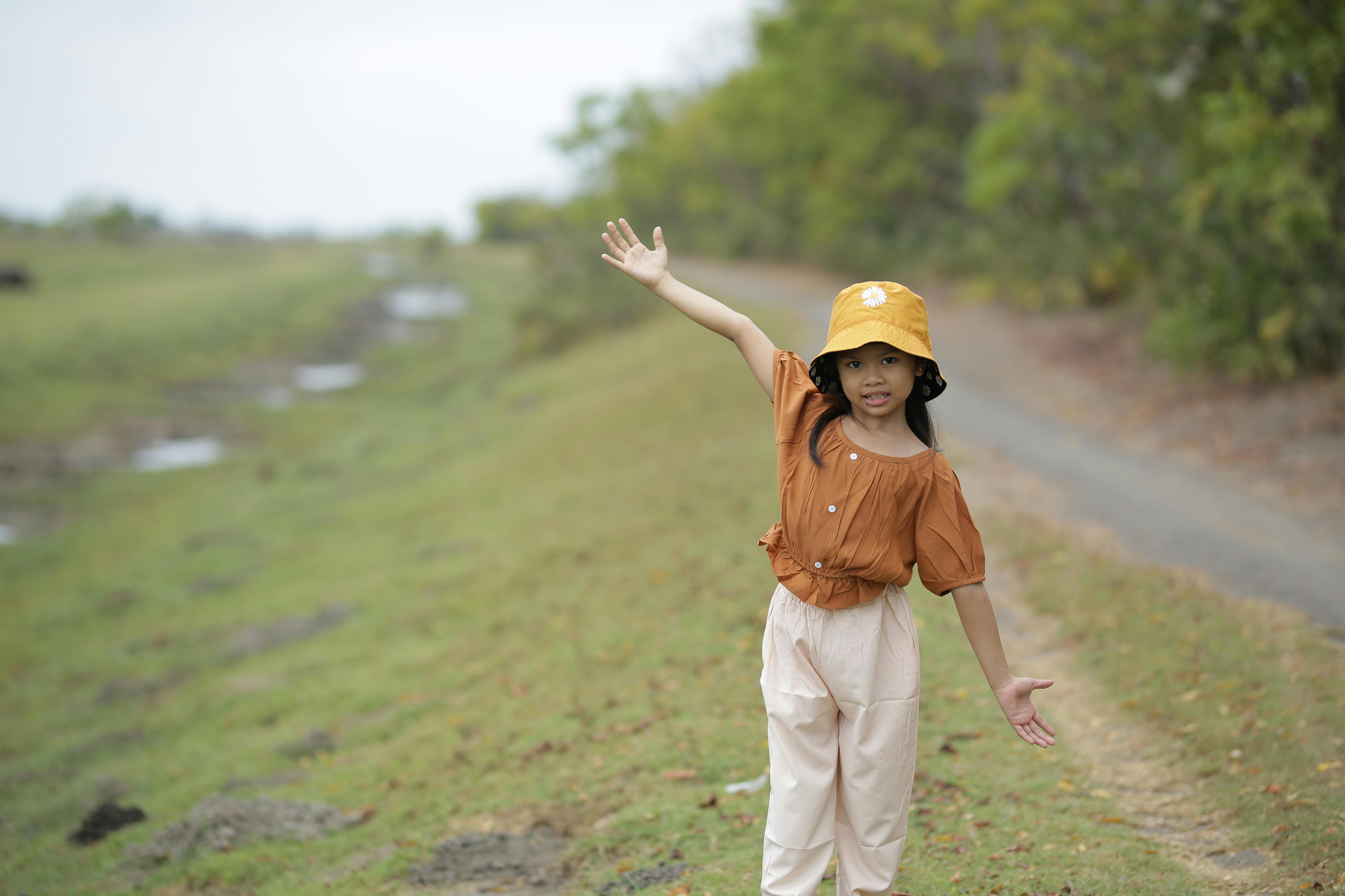 Cute Girls Wearing Red Bucket Hats · Free Stock Photo