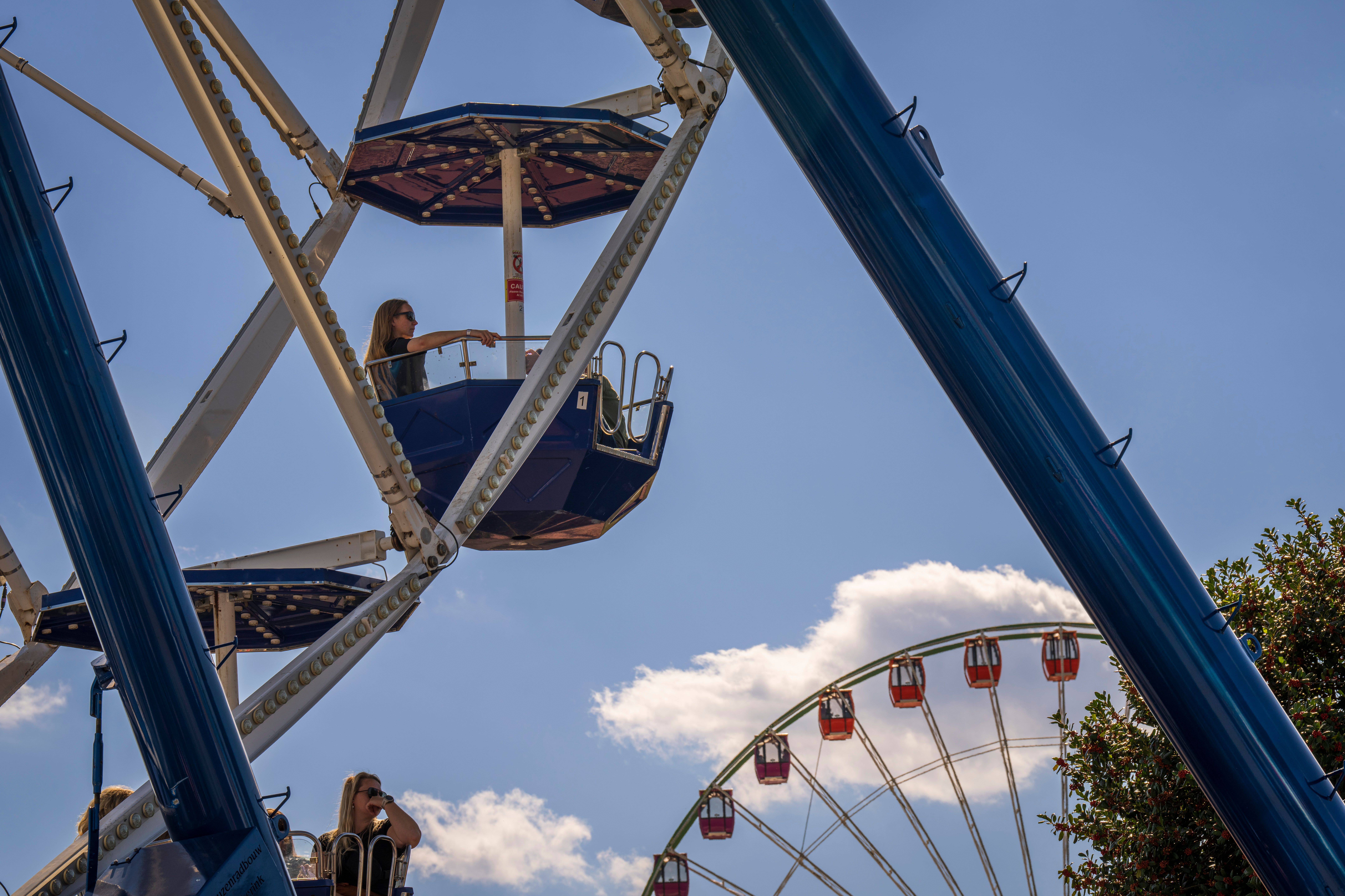 People Riding a Ferris Wheel · Free Stock Photo