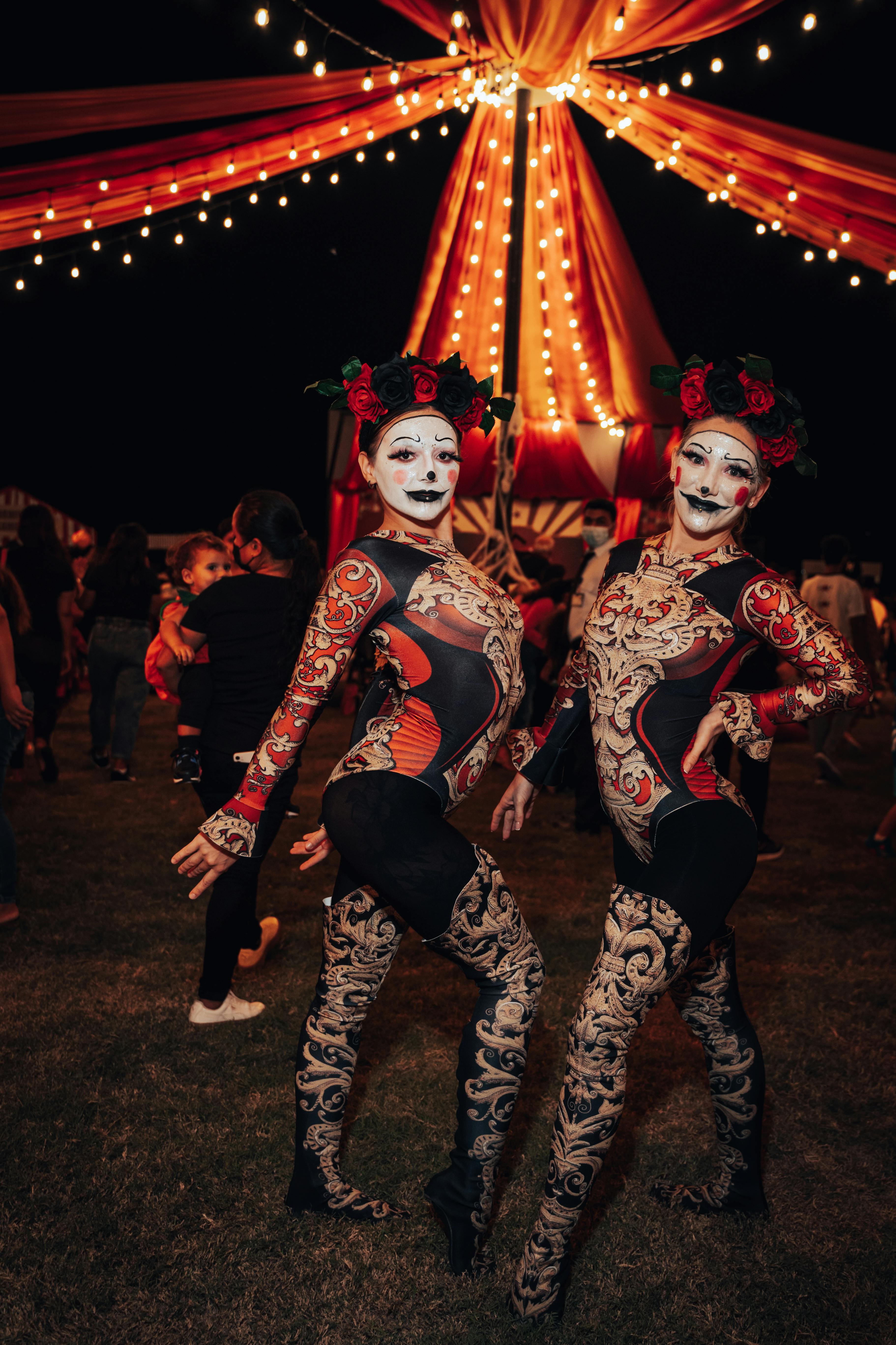 Women in Costumes on Festival at Night · Free Stock Photo