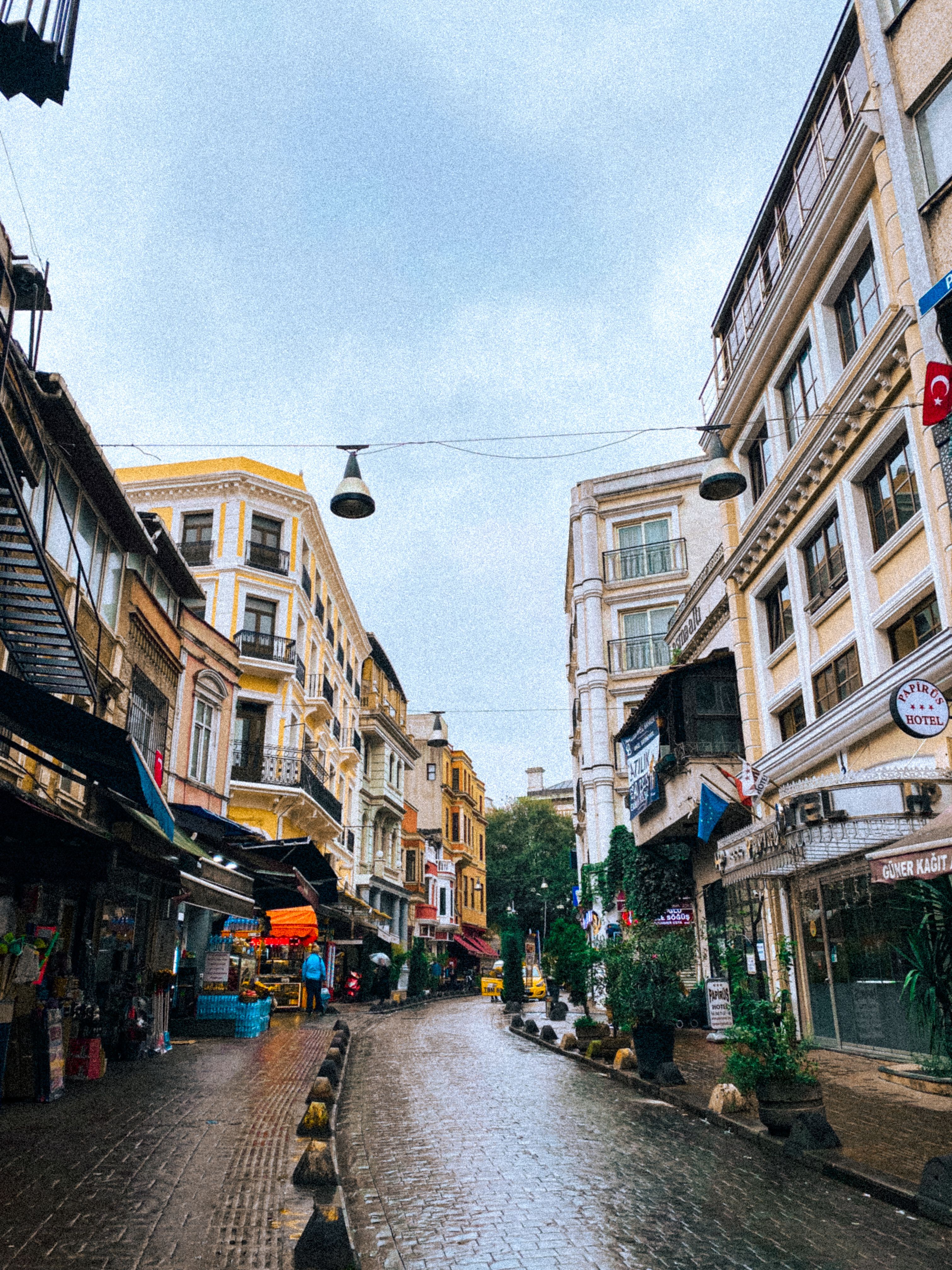 A Low Angle Shot of a Street Between Buildings · Free Stock Photo