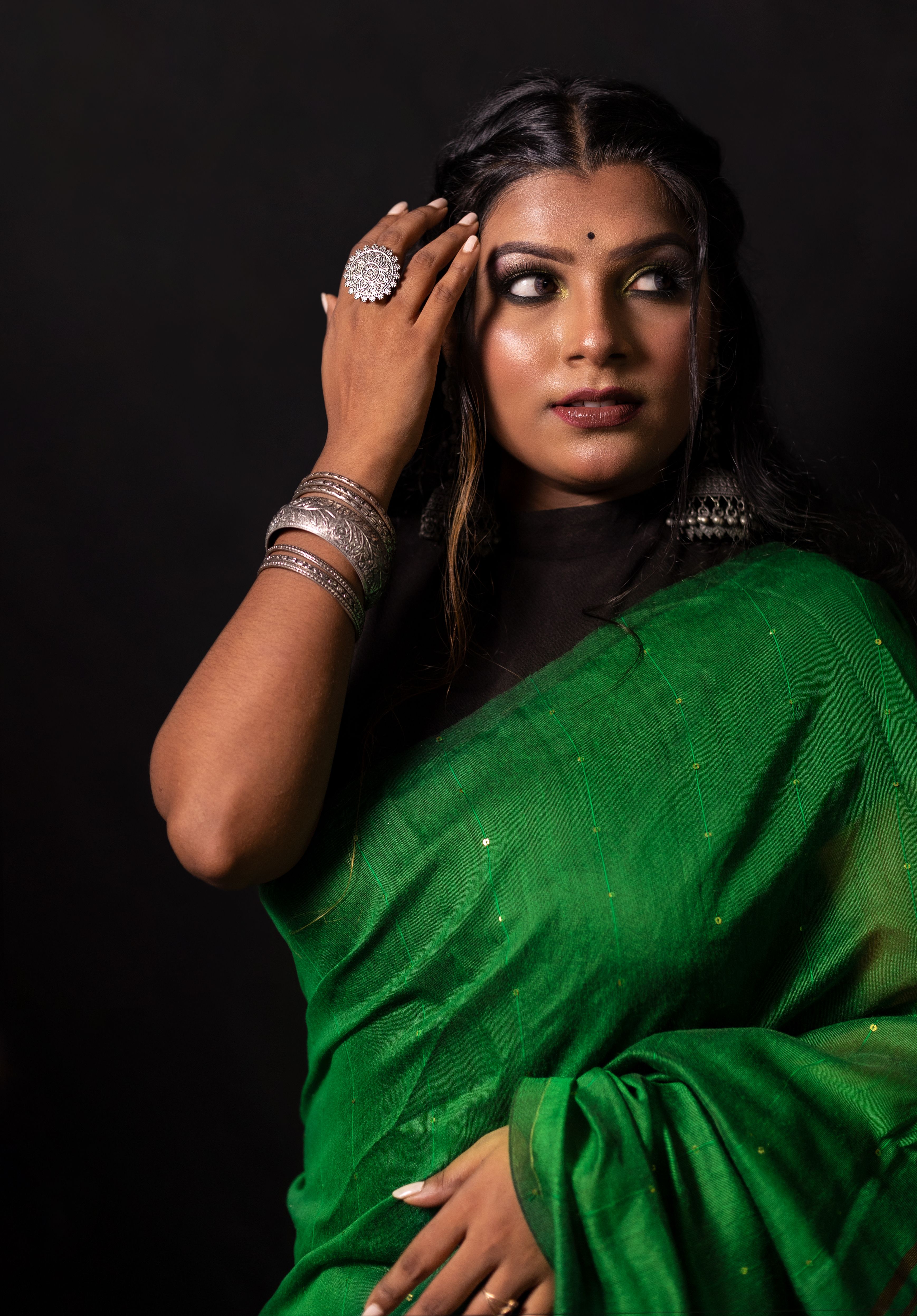 Close-Up Shot of a Girl in Green Traditional Clothing · Free Stock Photo