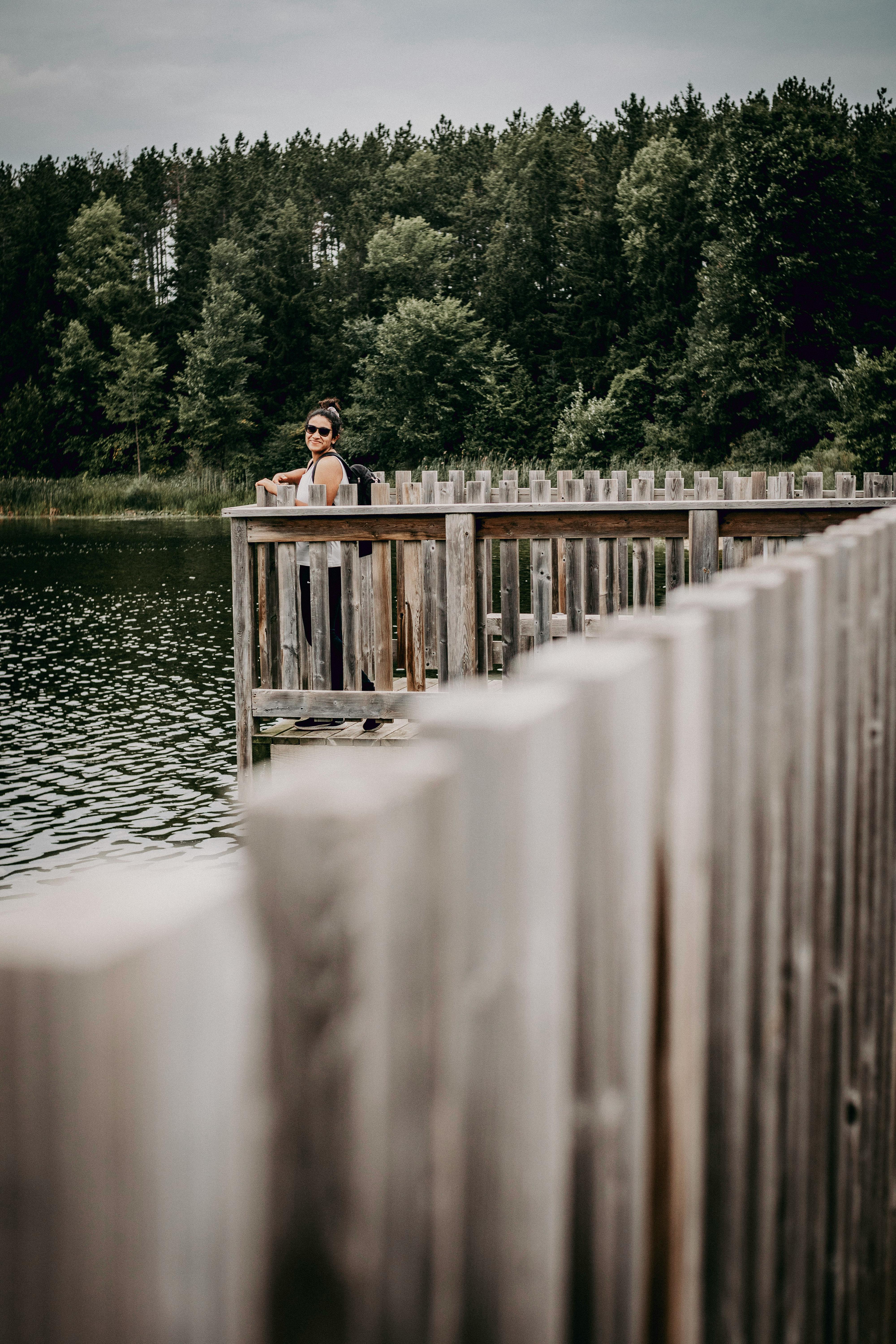 Woman Posing on Wooden Dam · Free Stock Photo