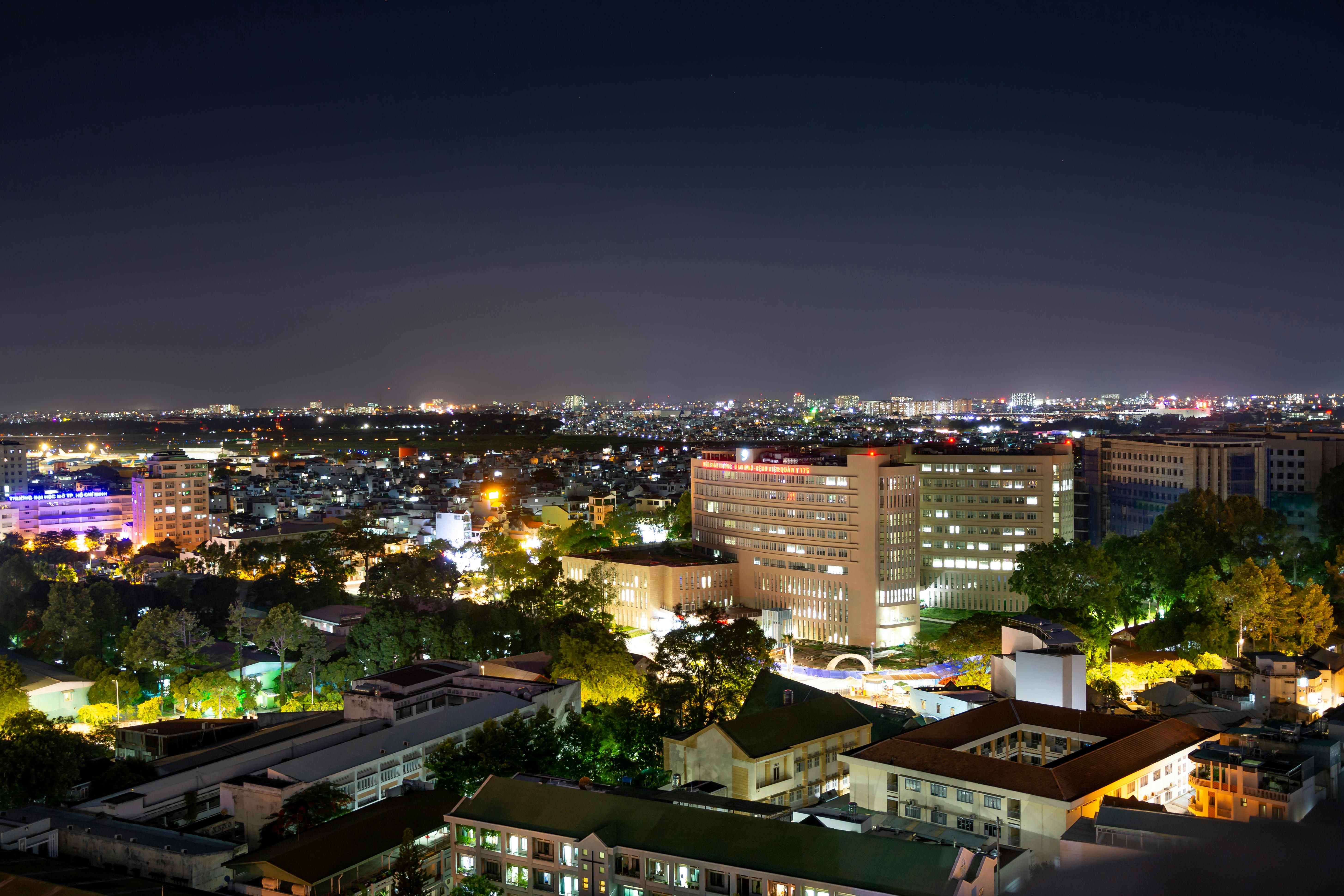 Aerial View of City Buildings at Night · Free Stock Photo