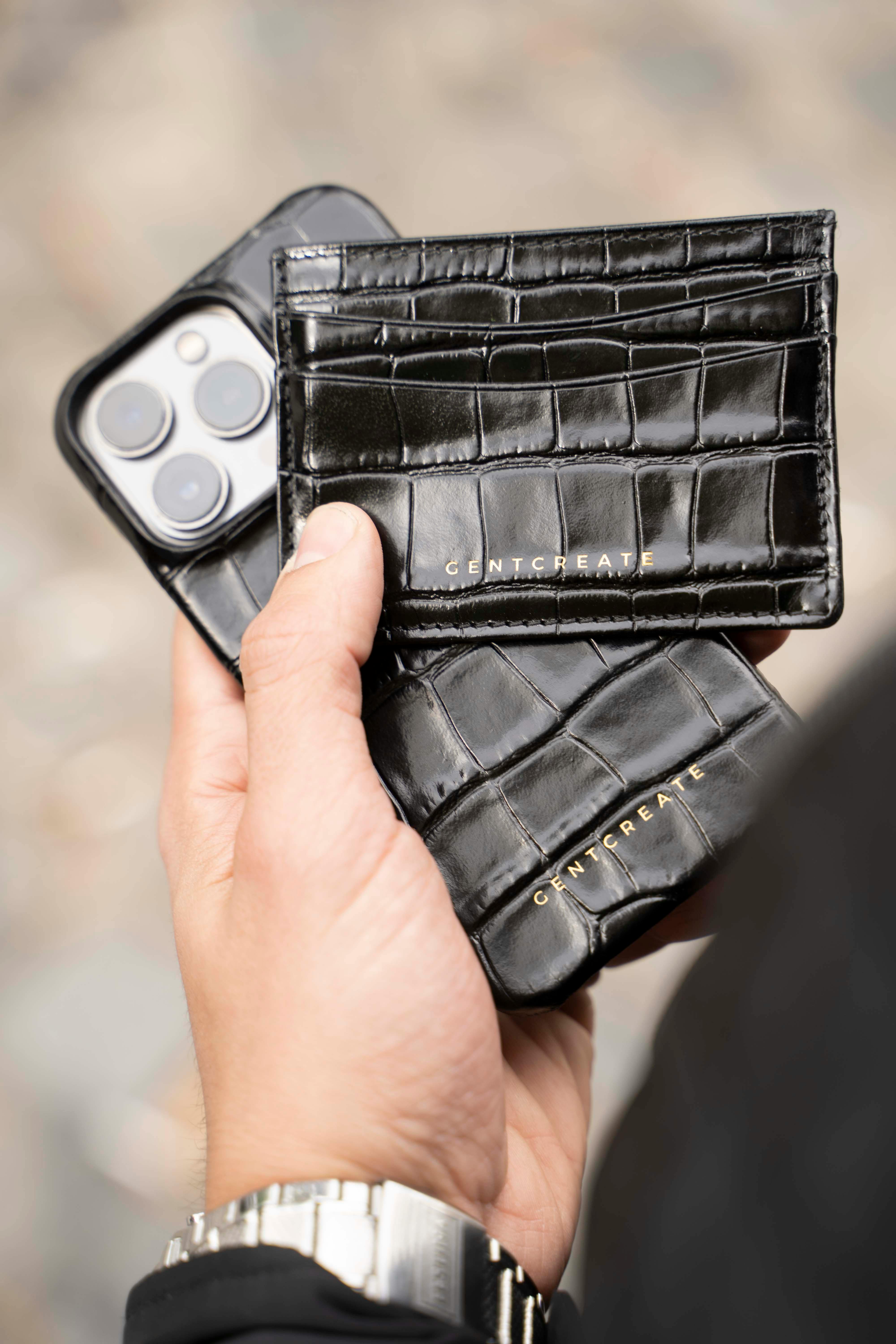 Close-Up Shot of a Person Holding a Wallet and a Smartphone · Free ...