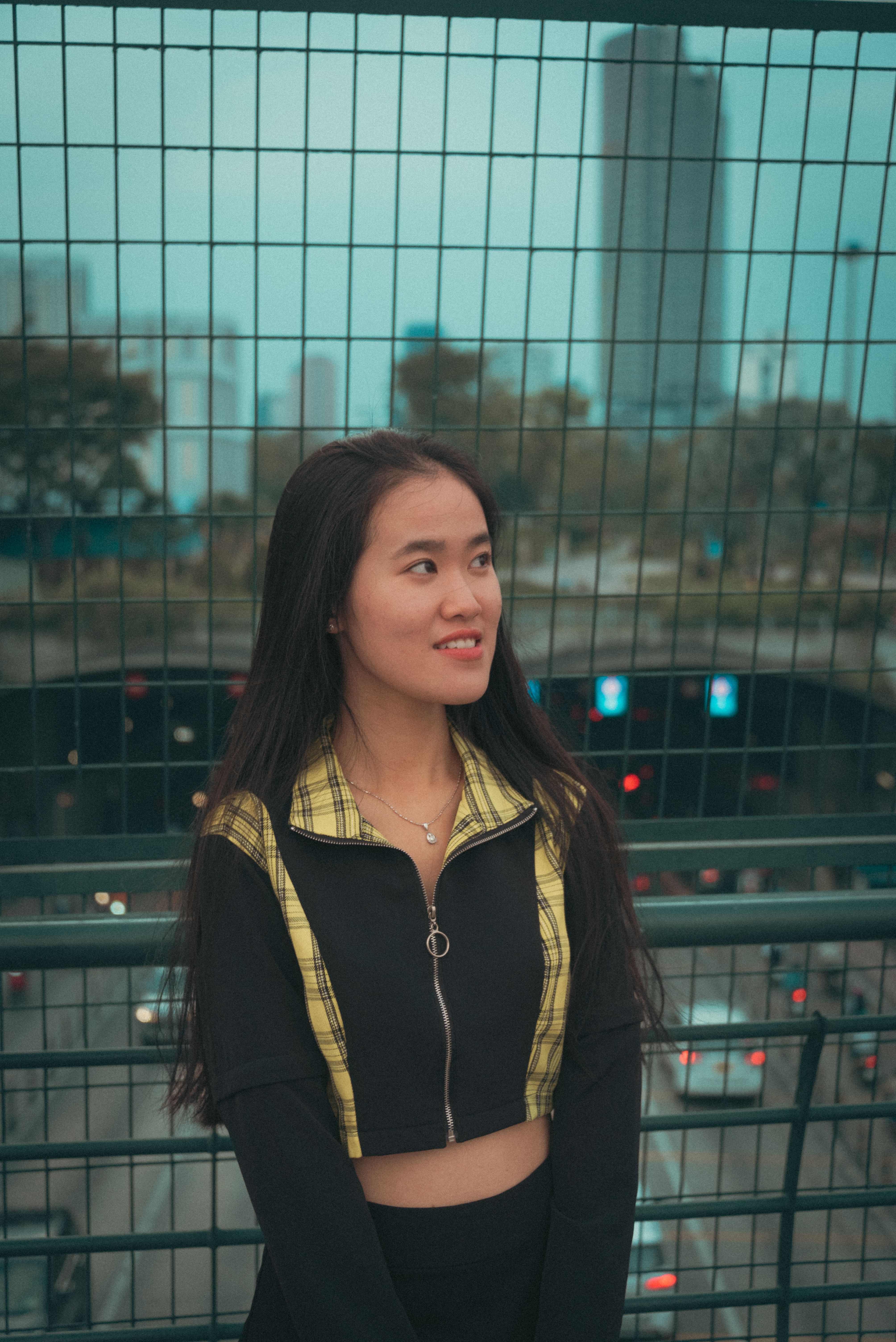Woman Posing on Metal Railings · Free Stock Photo