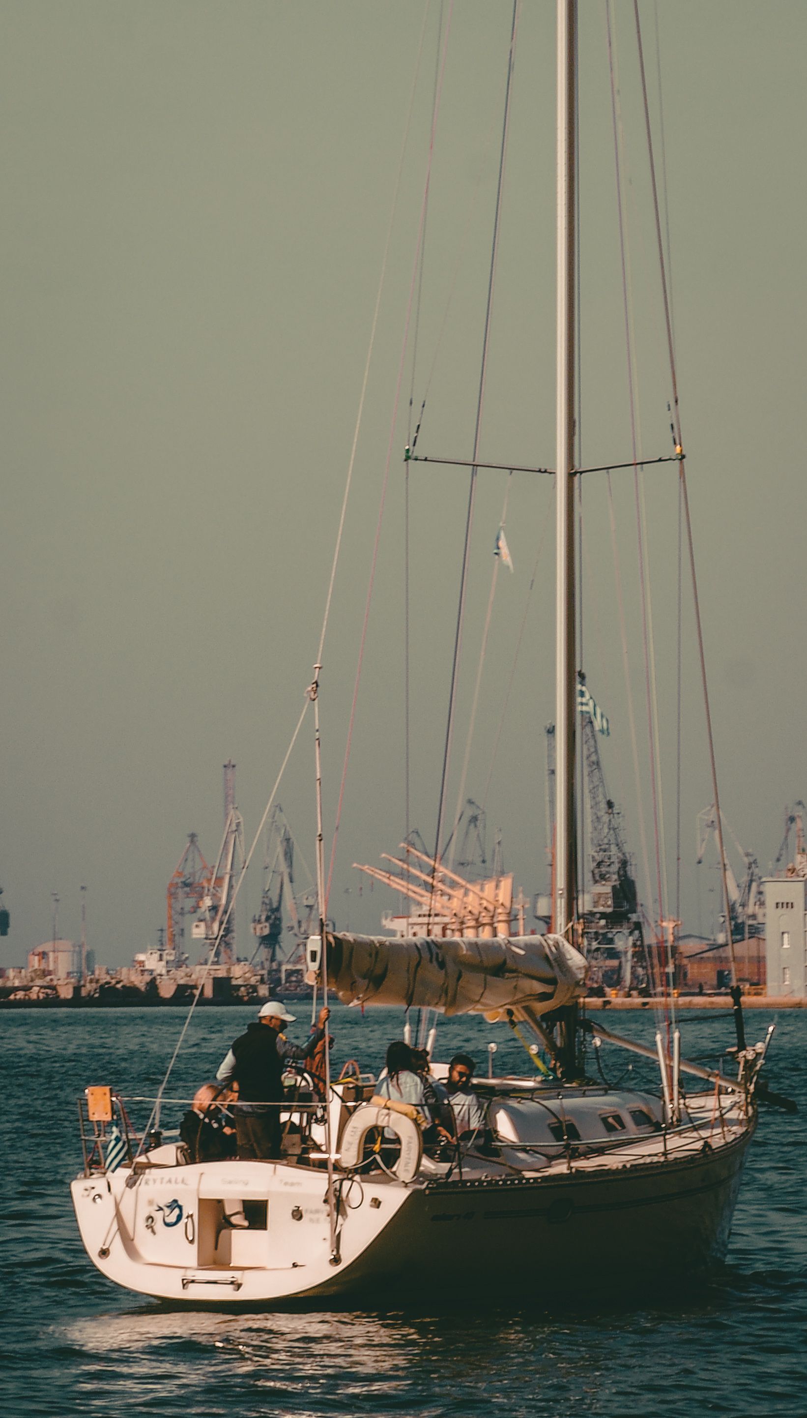 Old Boat with Sails in Water near Shore · Free Stock Photo