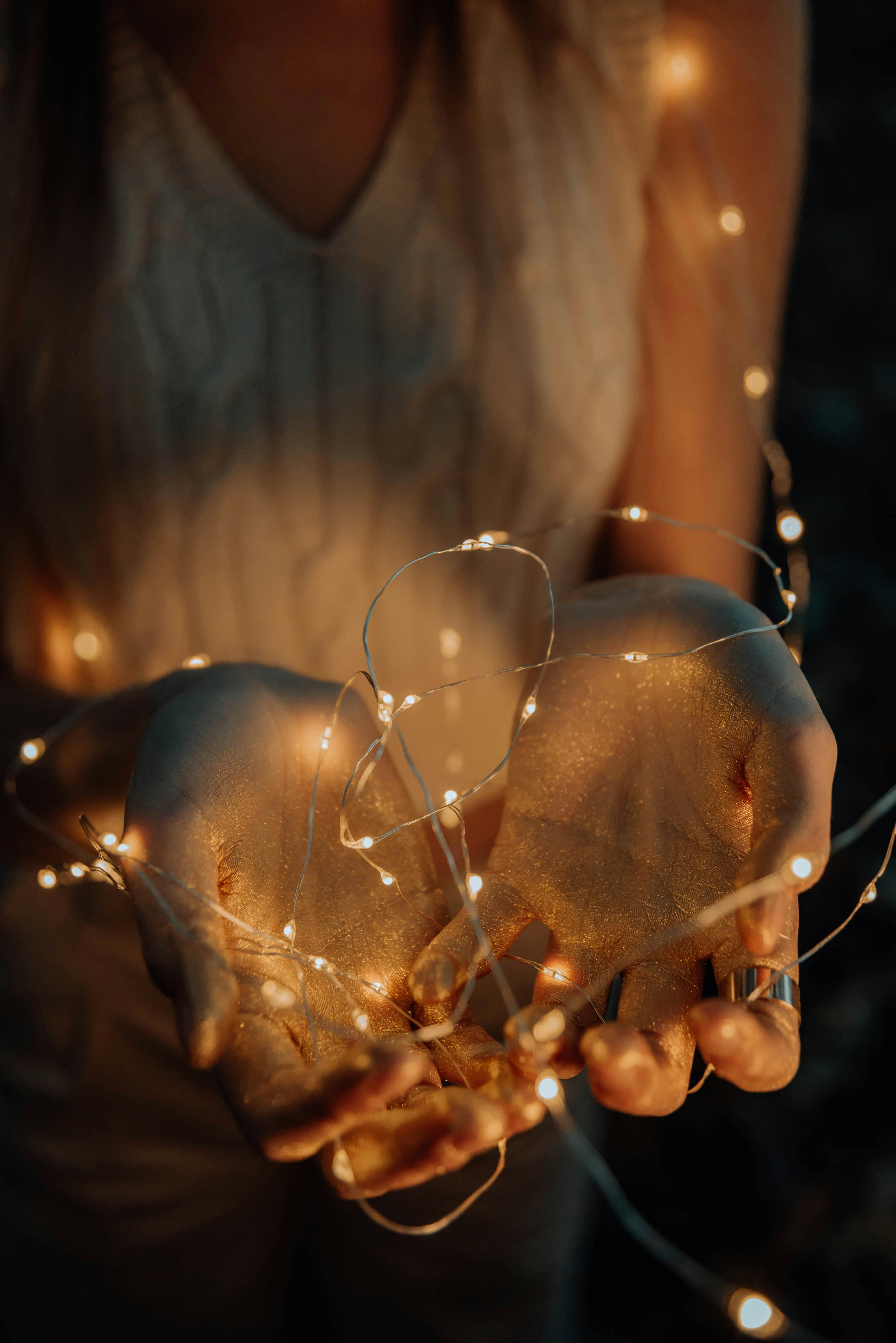 A Person Holding Lights · Free Stock Photo