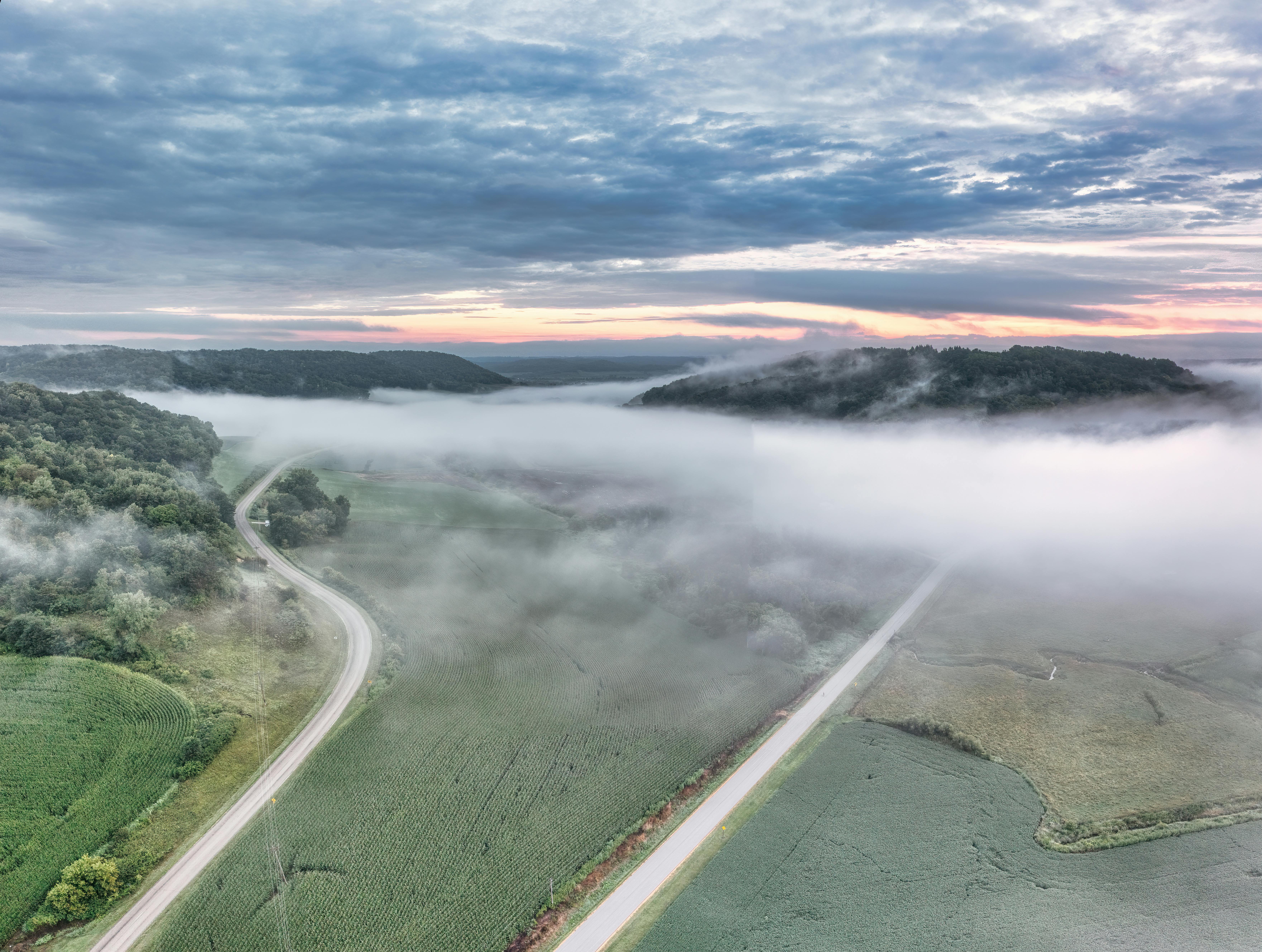 An Aerial Photography of Green Grass Field Under the Cloudy Sky · Free ...
