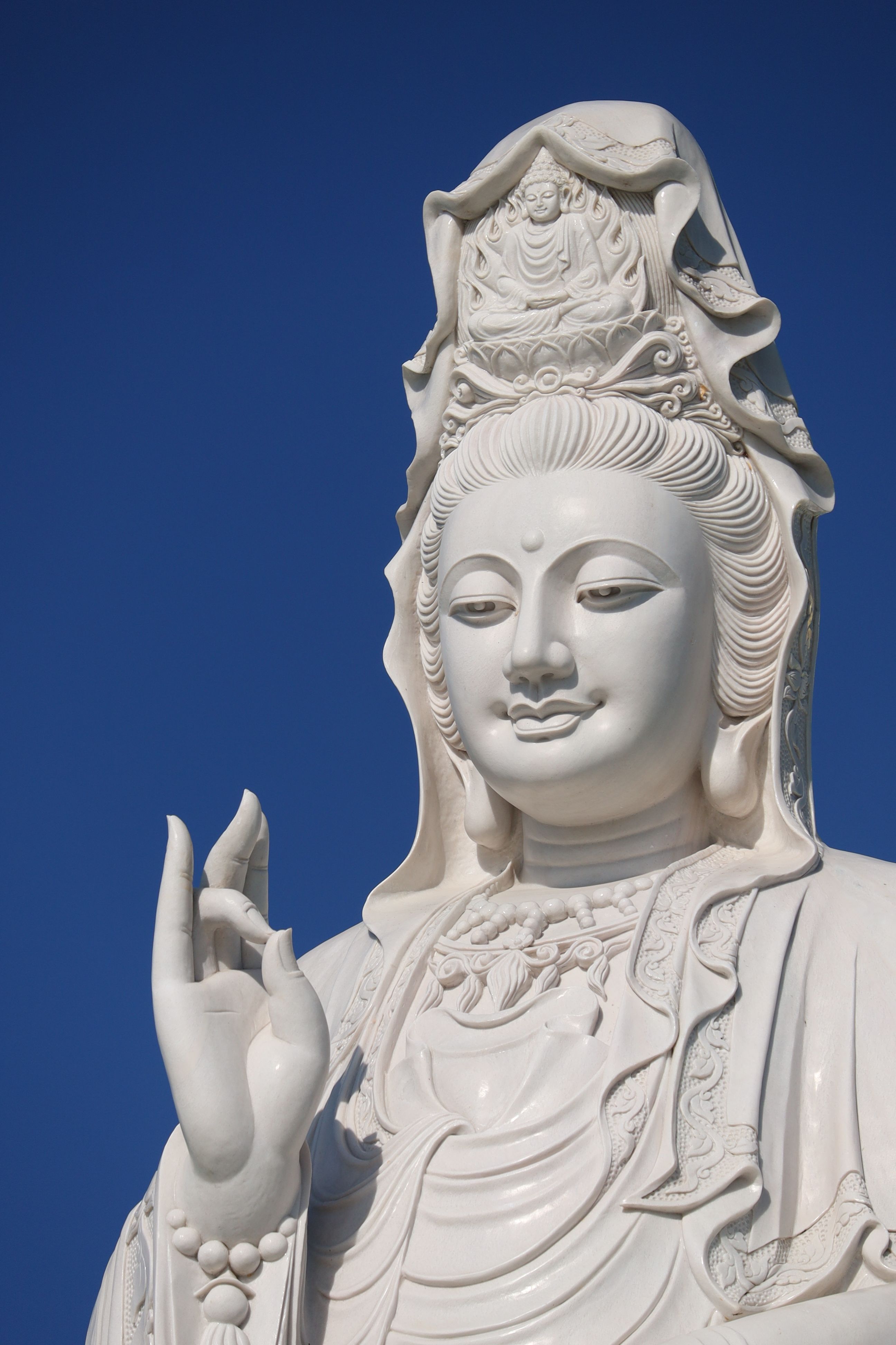 Gray Statue Surrounded by Green Trees · Free Stock Photo