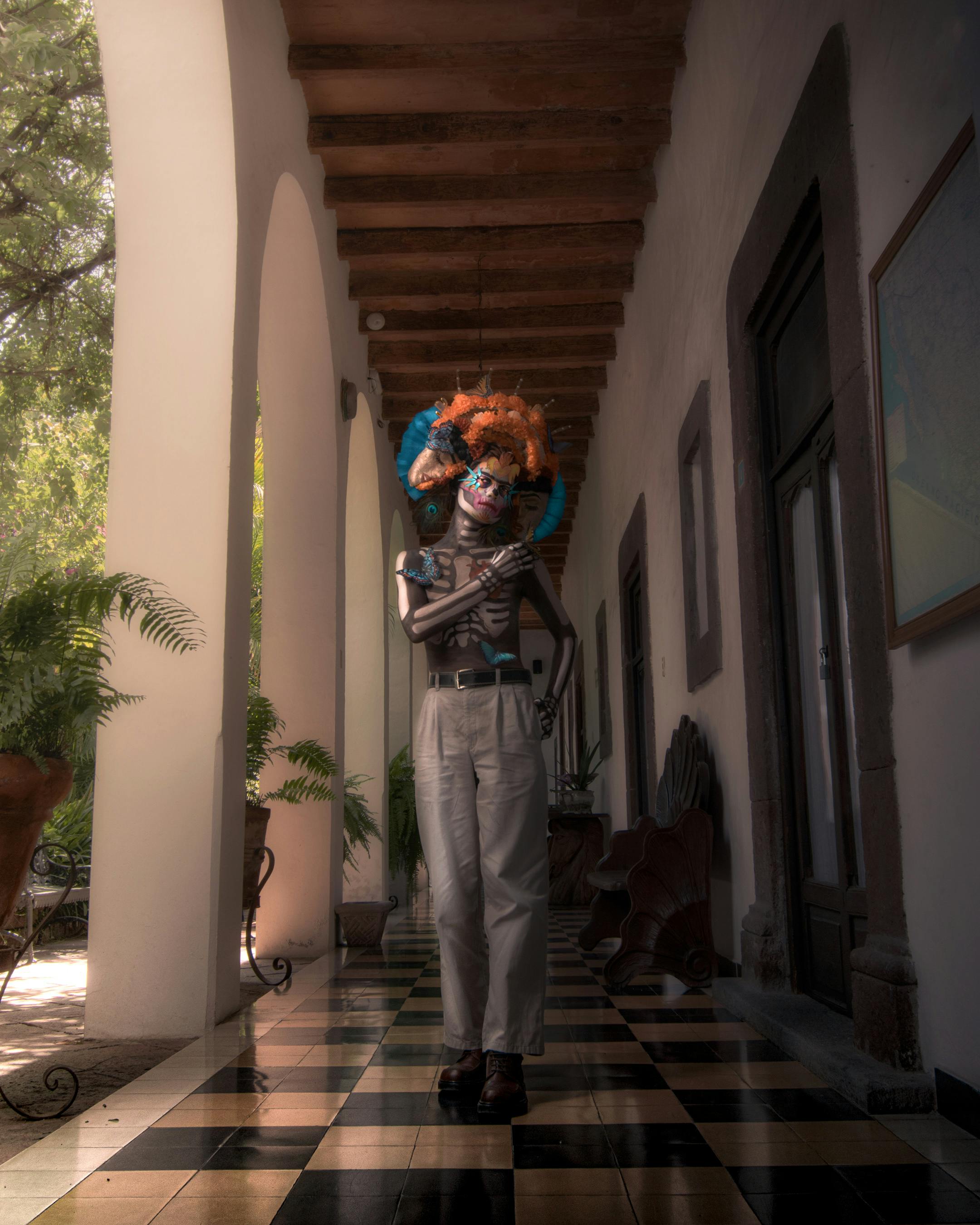 A Woman Drawing a Cobweb on Face using an Eyeliner · Free Stock Photo