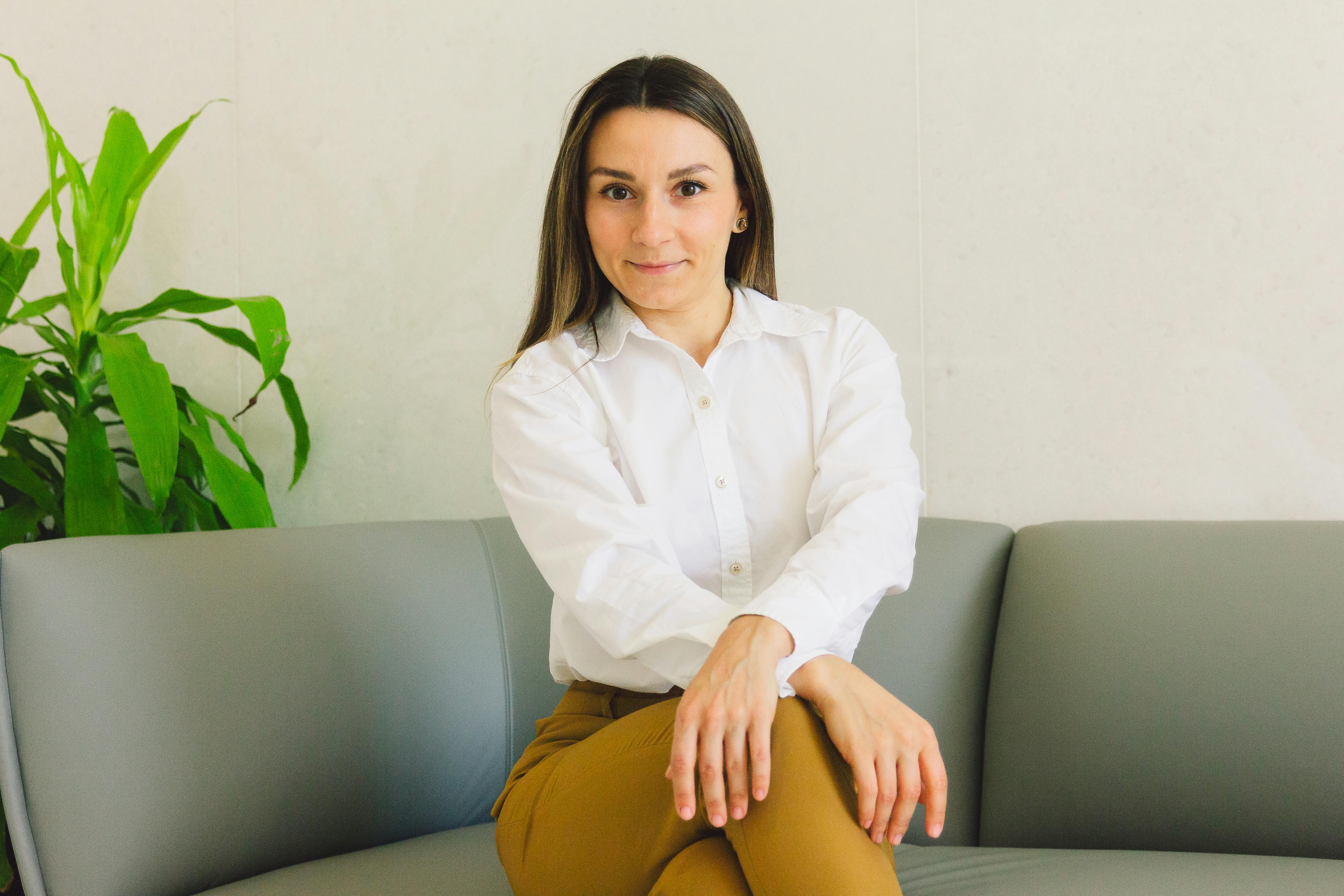 A Woman Holding a Key · Free Stock Photo