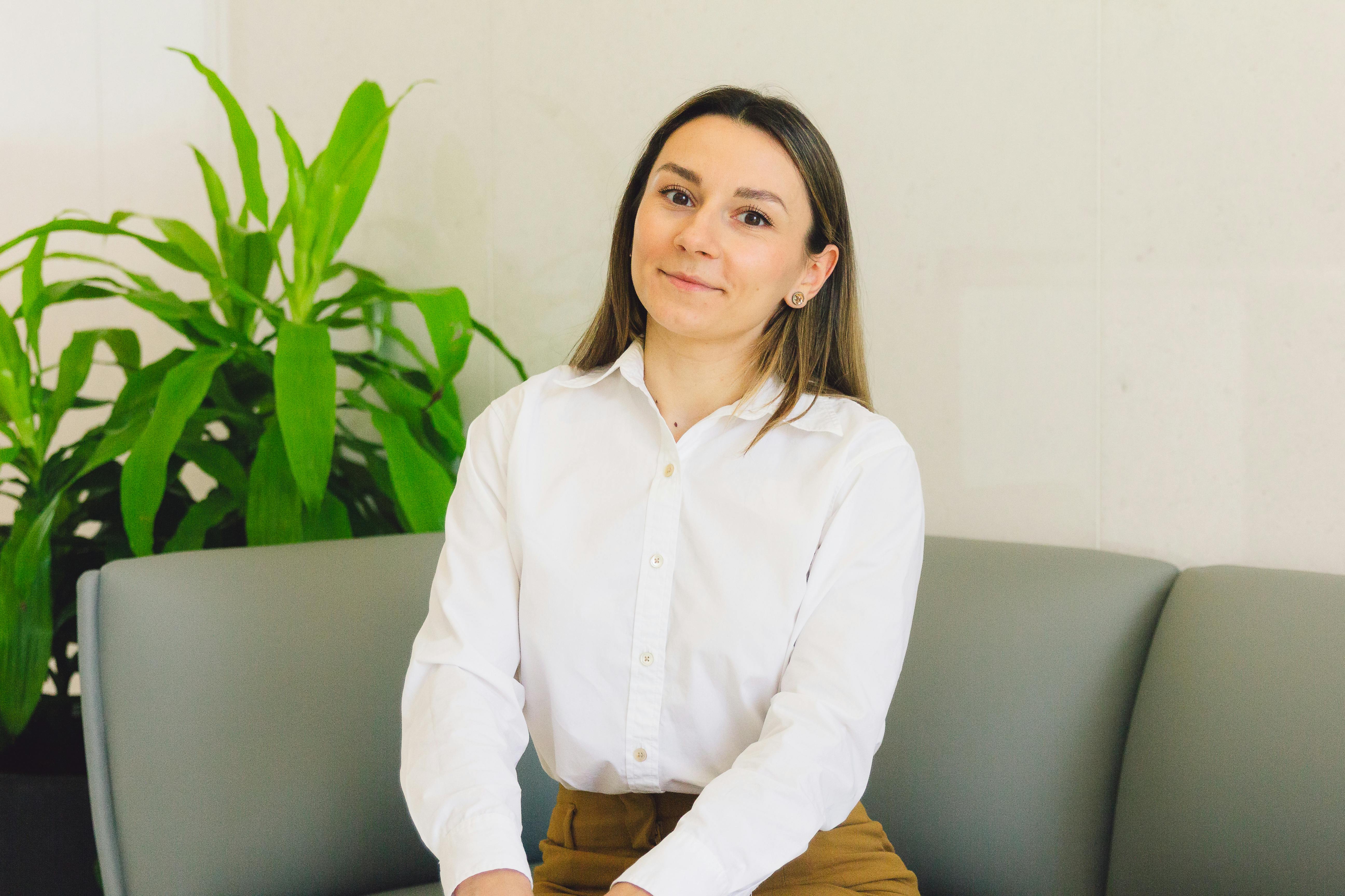 A Woman Holding a Key · Free Stock Photo
