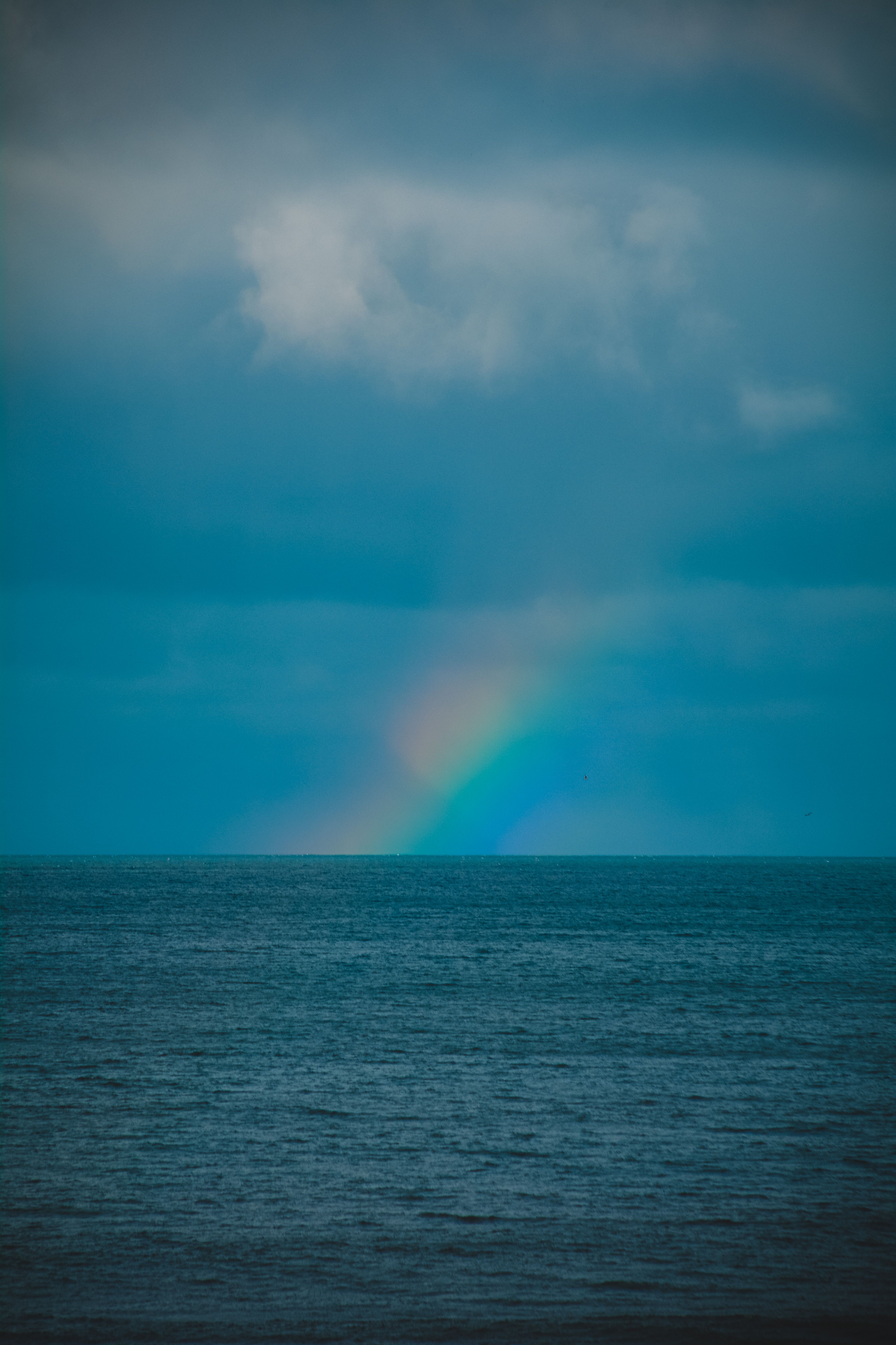 Blue Ocean and Rainbow Under the Sky · Free Stock Photo