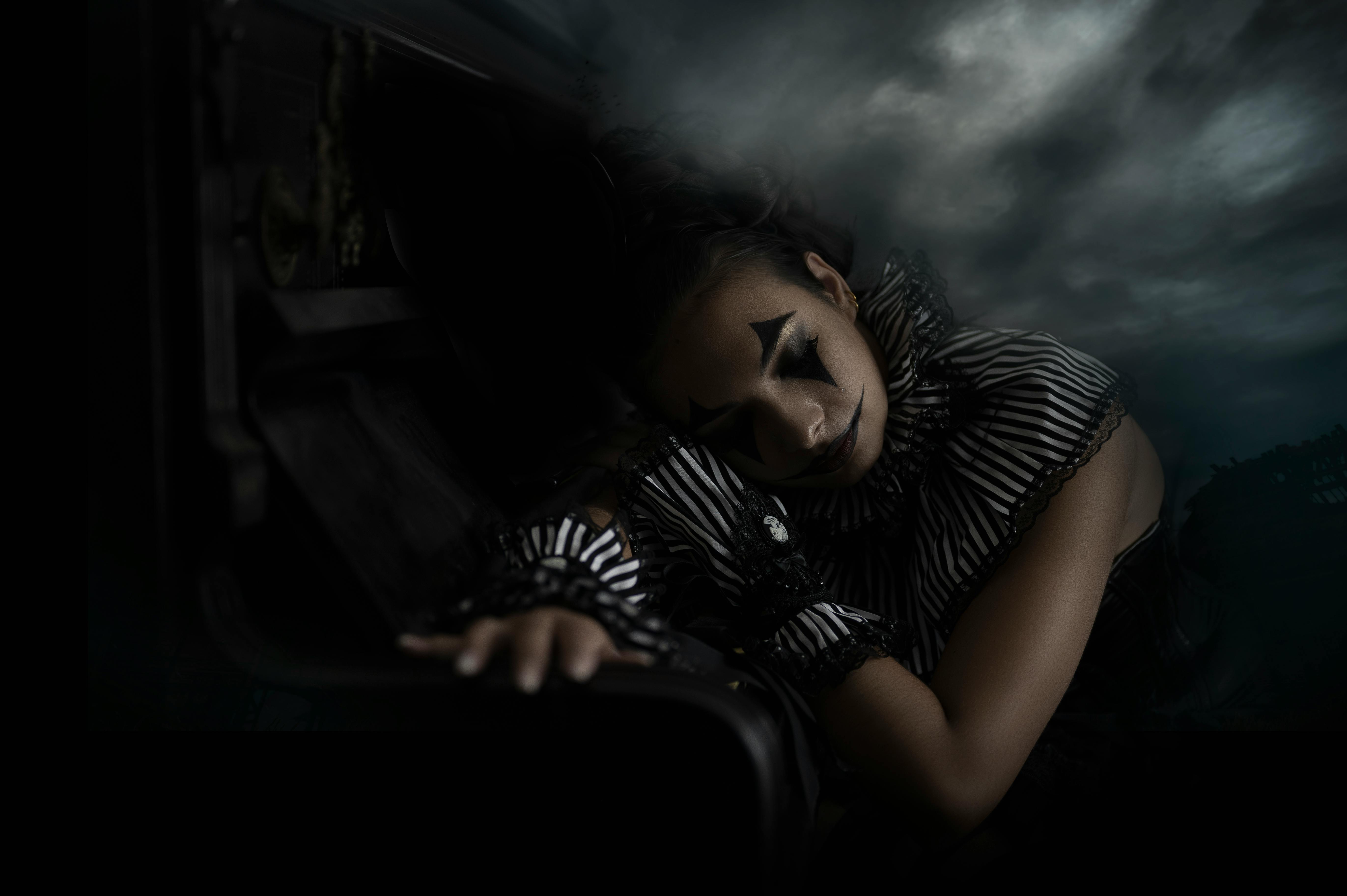 Kneeling Woman Looking as a Vampire · Free Stock Photo