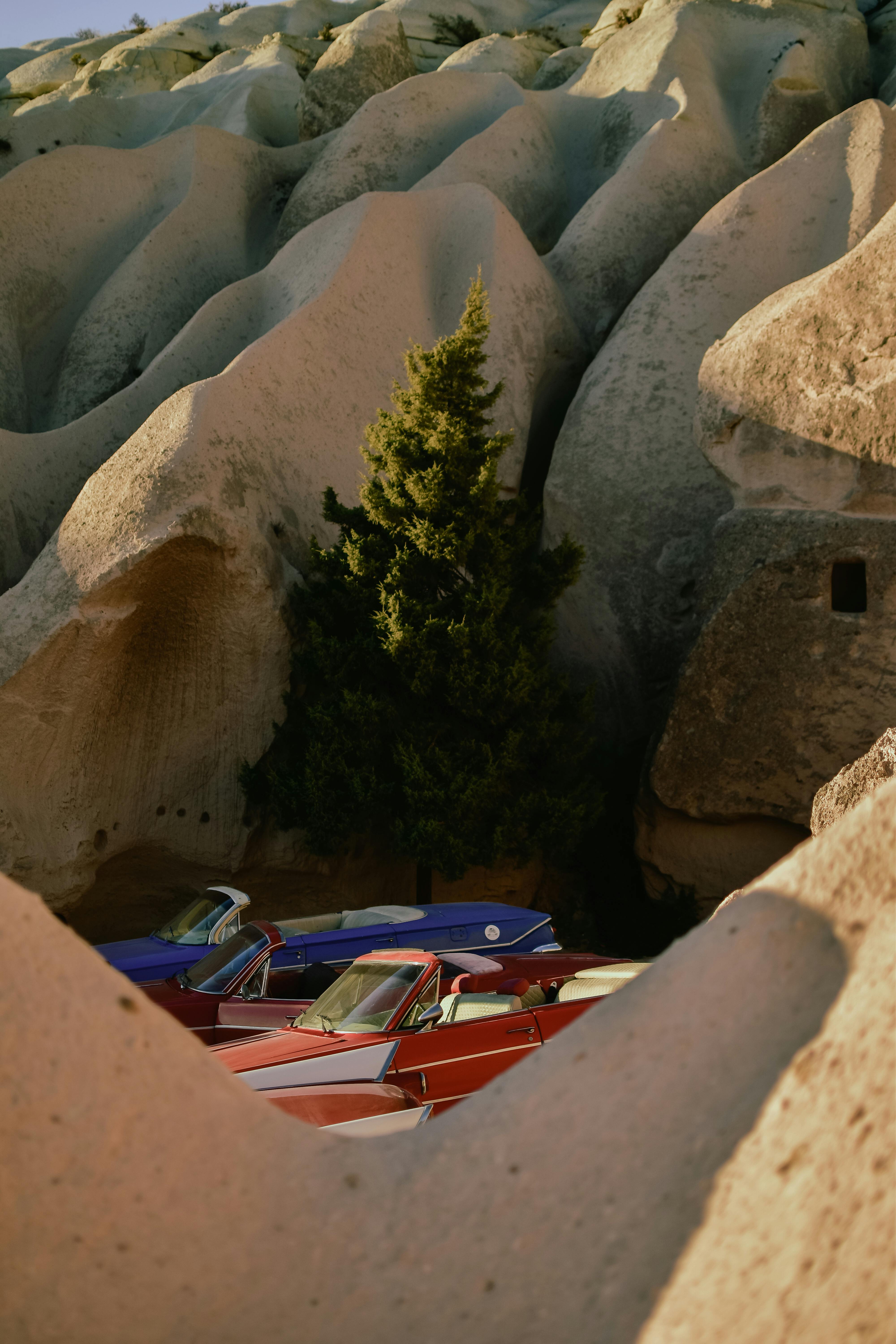 Sunset Over Rock Formation and Sea · Free Stock Photo