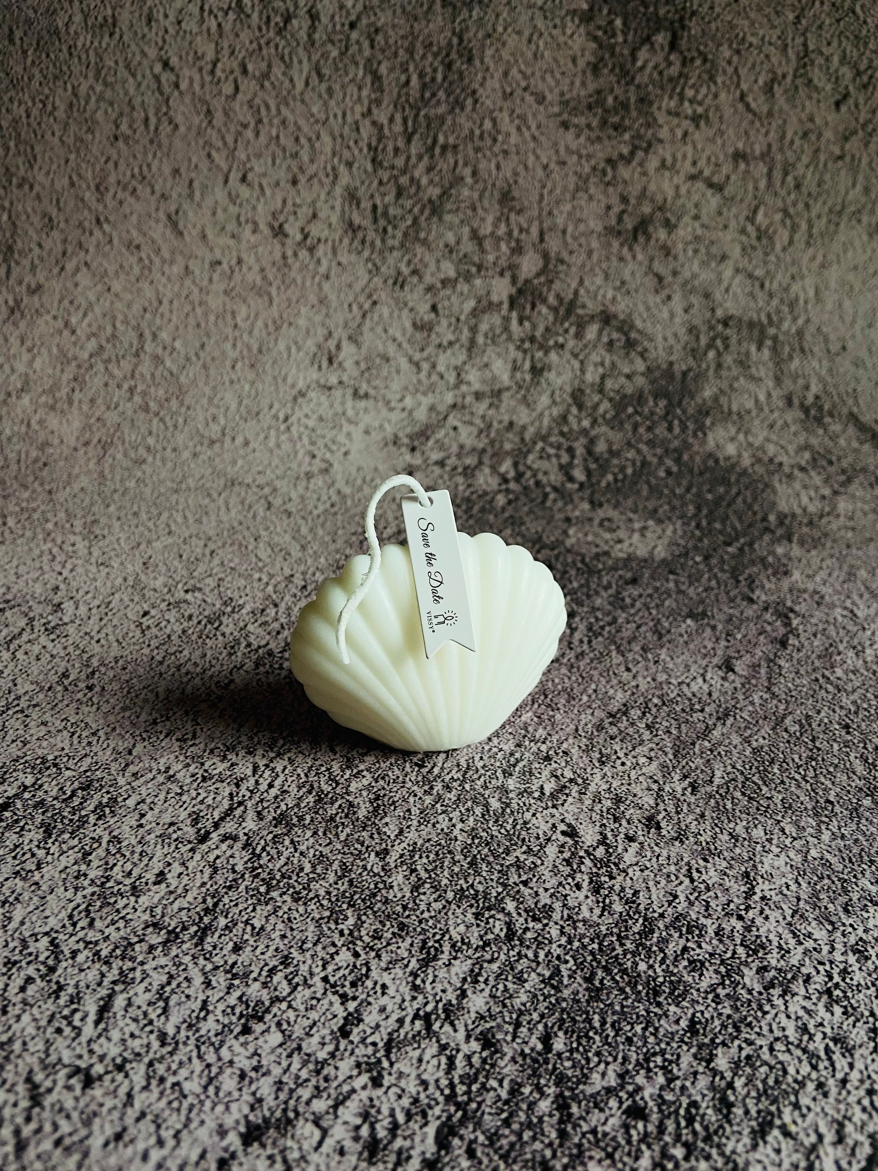 A Custom Shaped Candle on the Rough Surface · Free Stock Photo