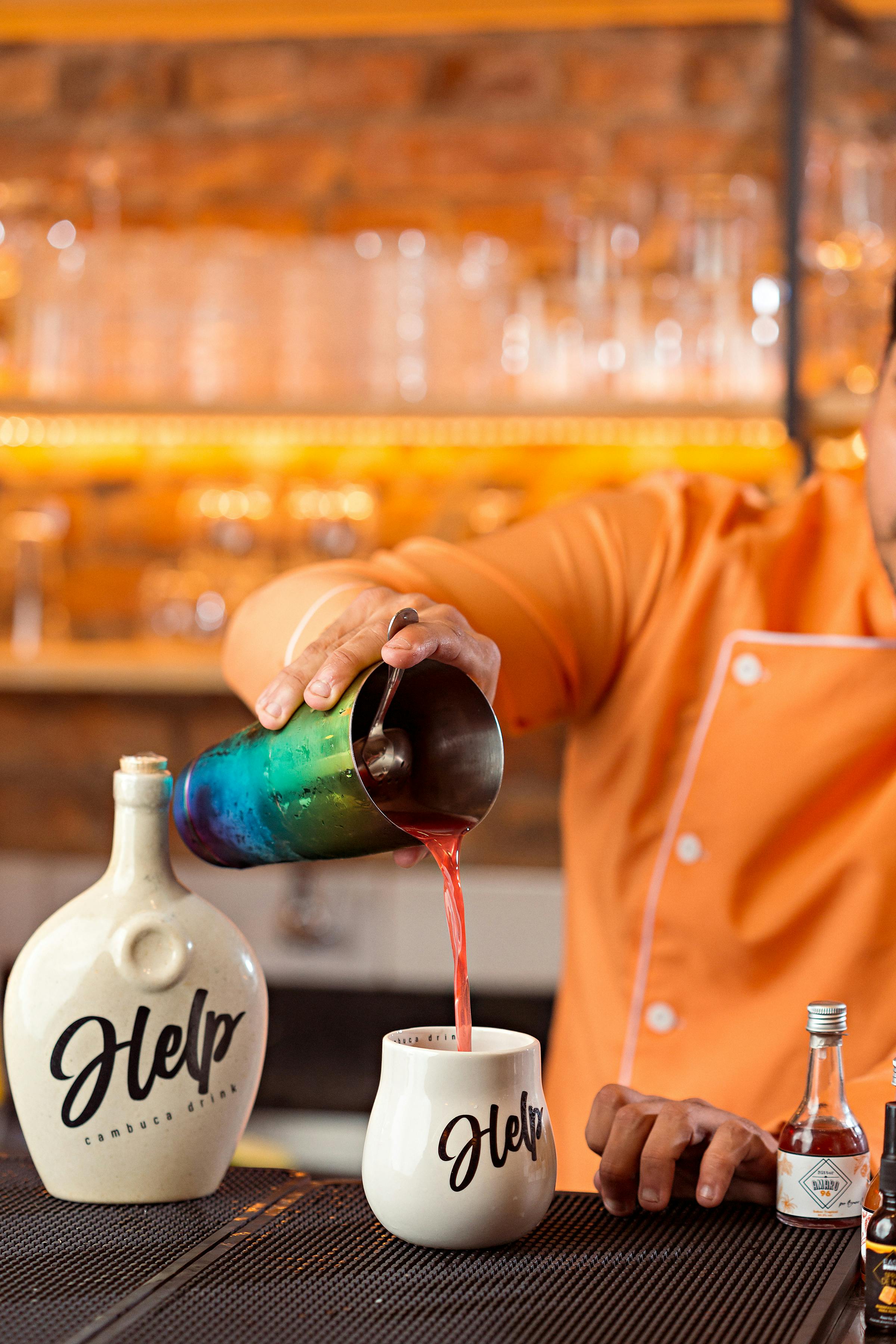 Pouring Pepsi into Glasses Next to Pizza · Free Stock Photo