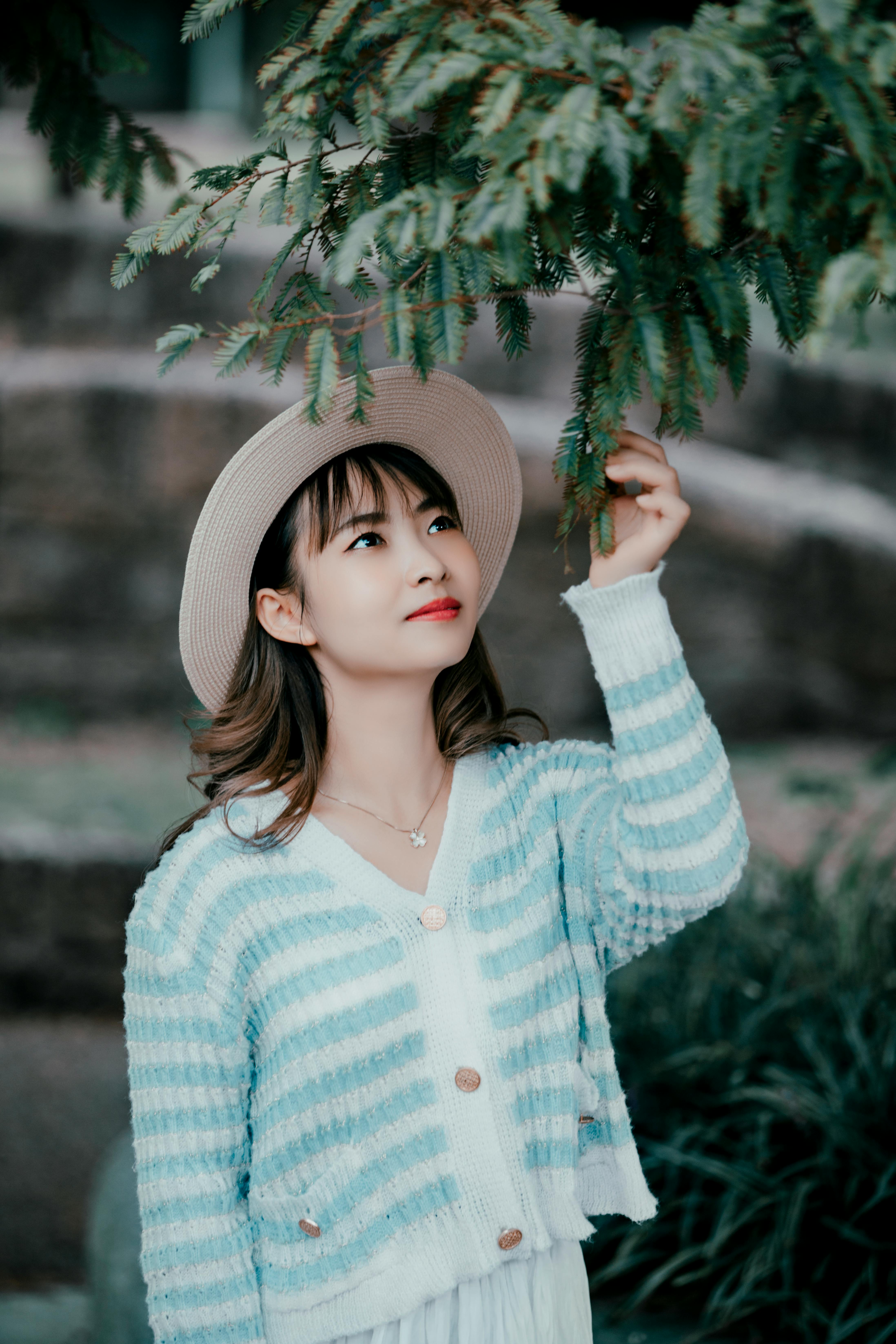 A Woman Wearing Cardigan Free Stock Photo