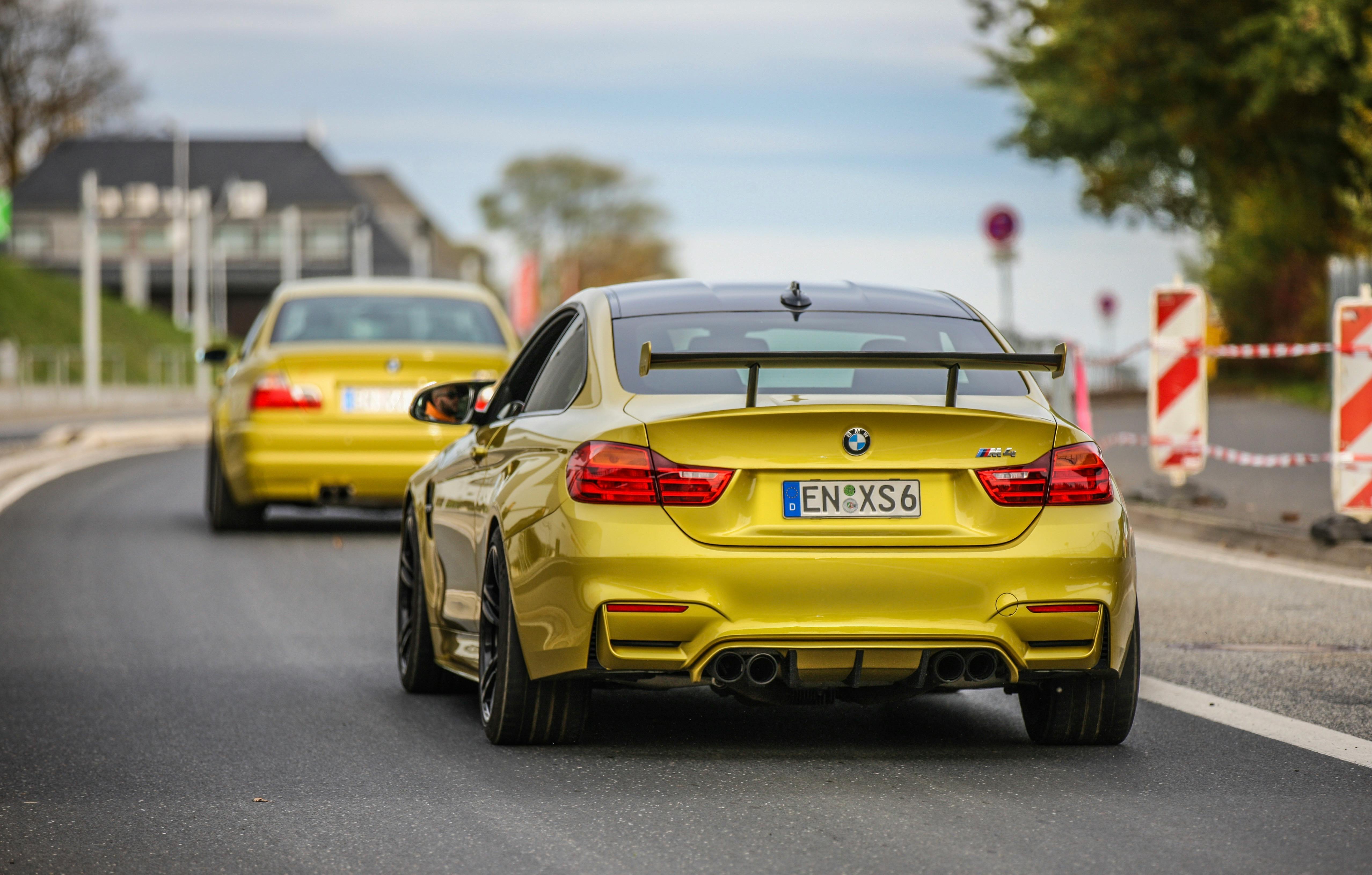 Back View Shot of Yellow Cars on the Road · Free Stock Photo