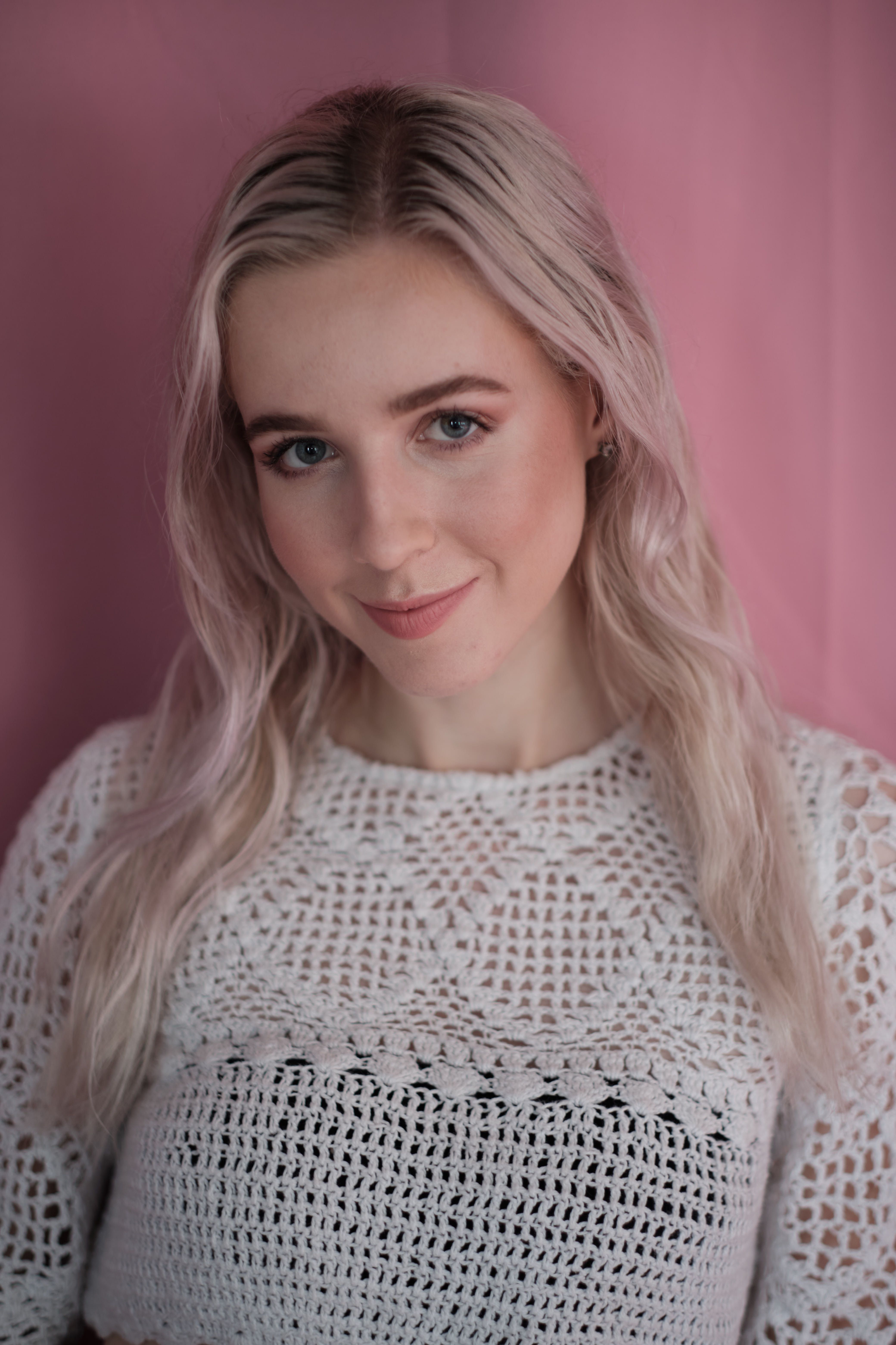 A Beautiful Woman in White Knitted Sweater · Free Stock Photo