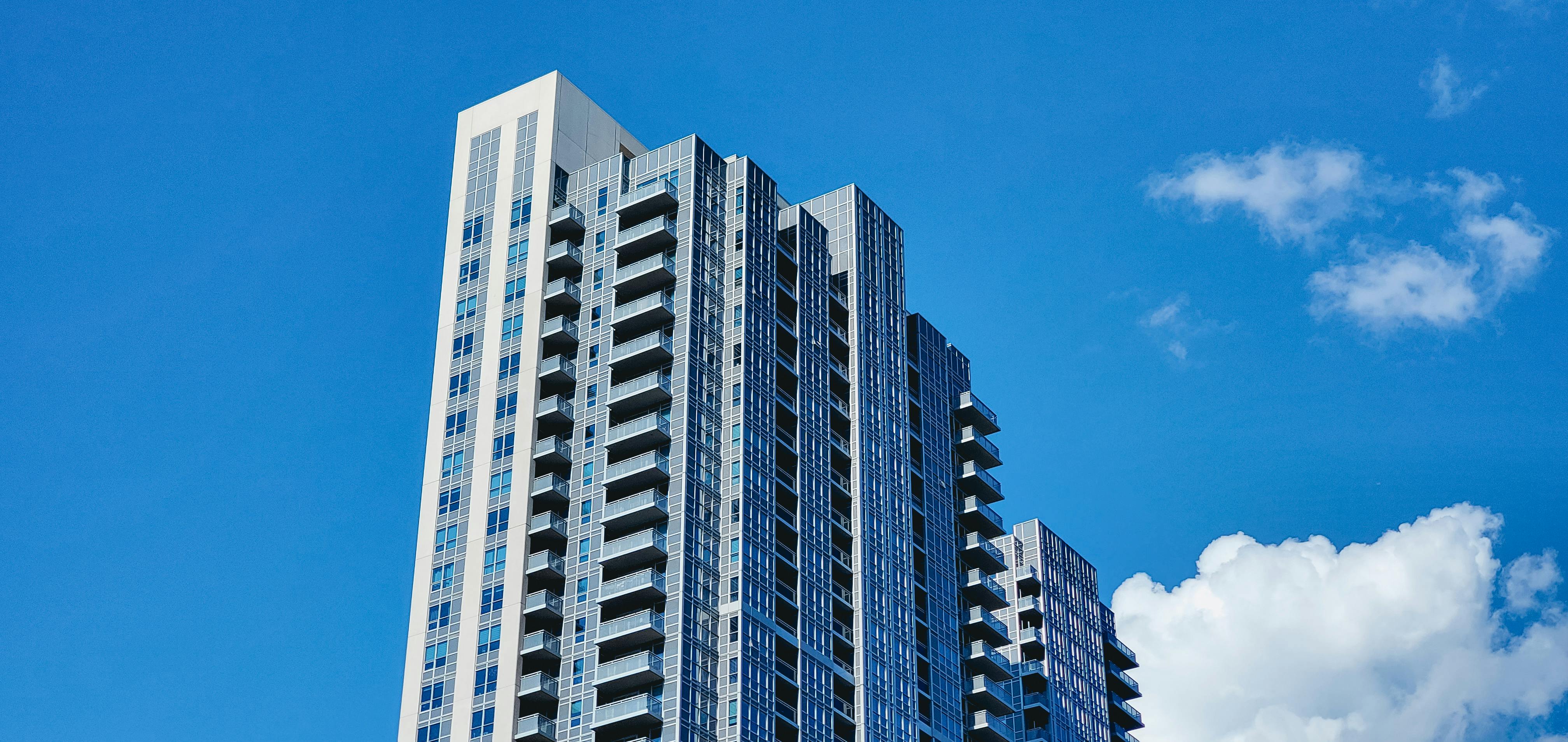 Blue and White High Rise Building · Free Stock Photo