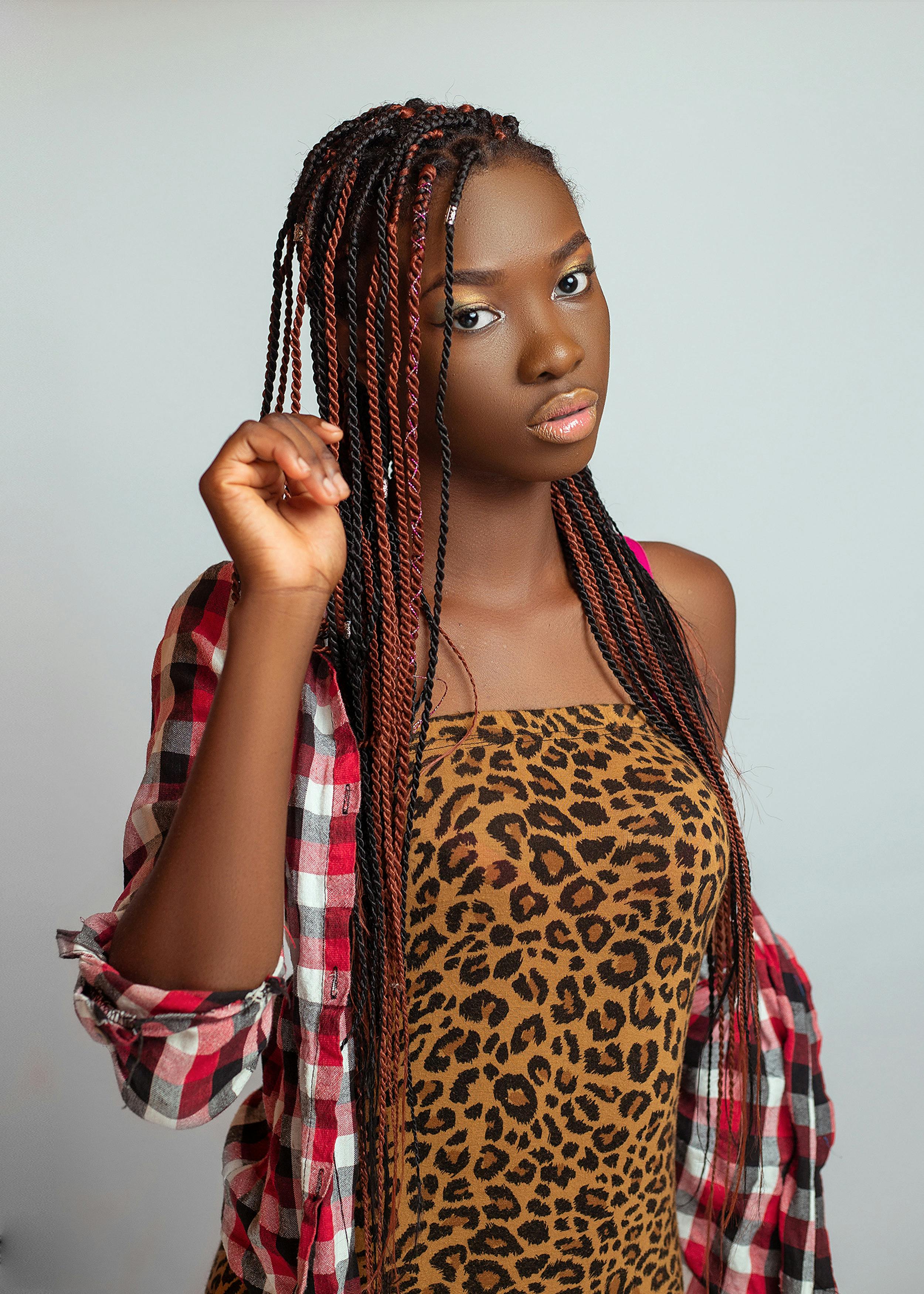 A Teenage Girl Wearing Leopard Print Clothing · Free Stock Photo
